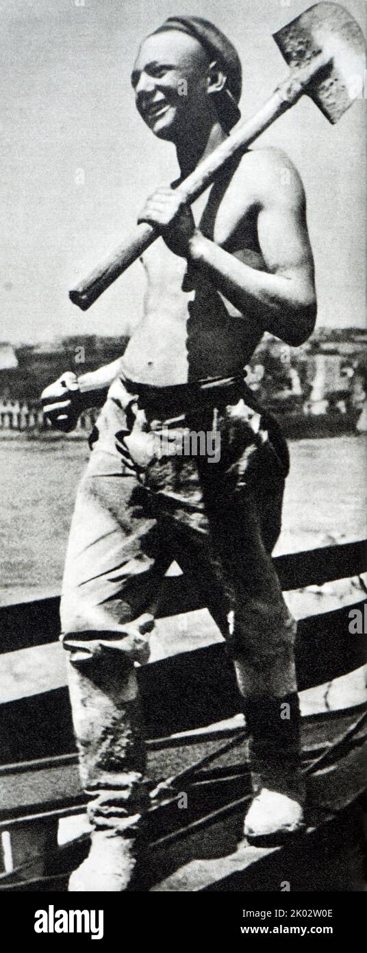 Propaganda photograph showing soviet construction worker during the ...