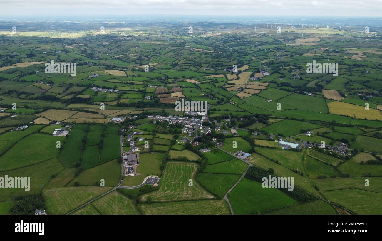 An aerial view of a small Irish village with green fields Stock Photo ...