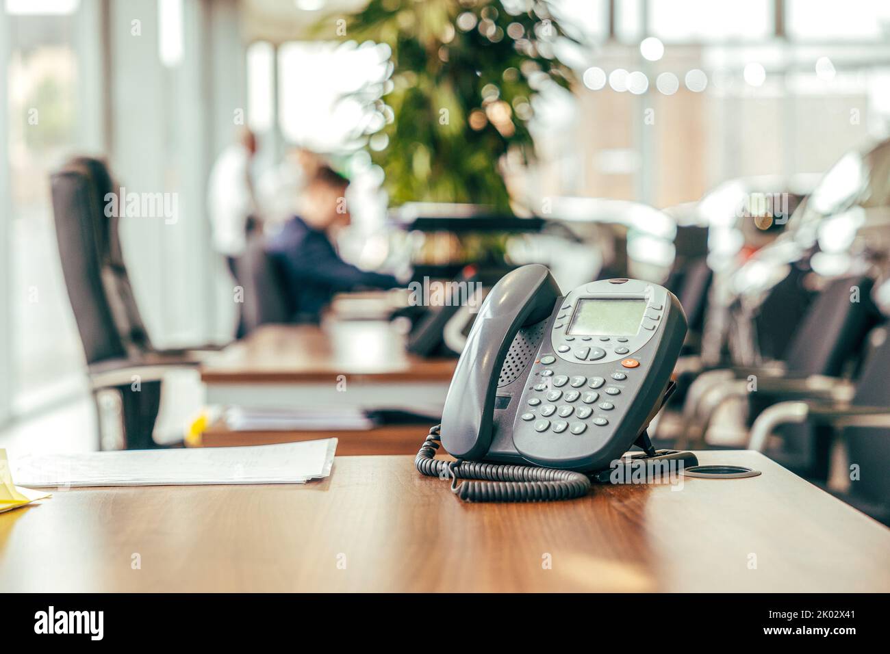 A black telephone in the office Stock Photo - Alamy