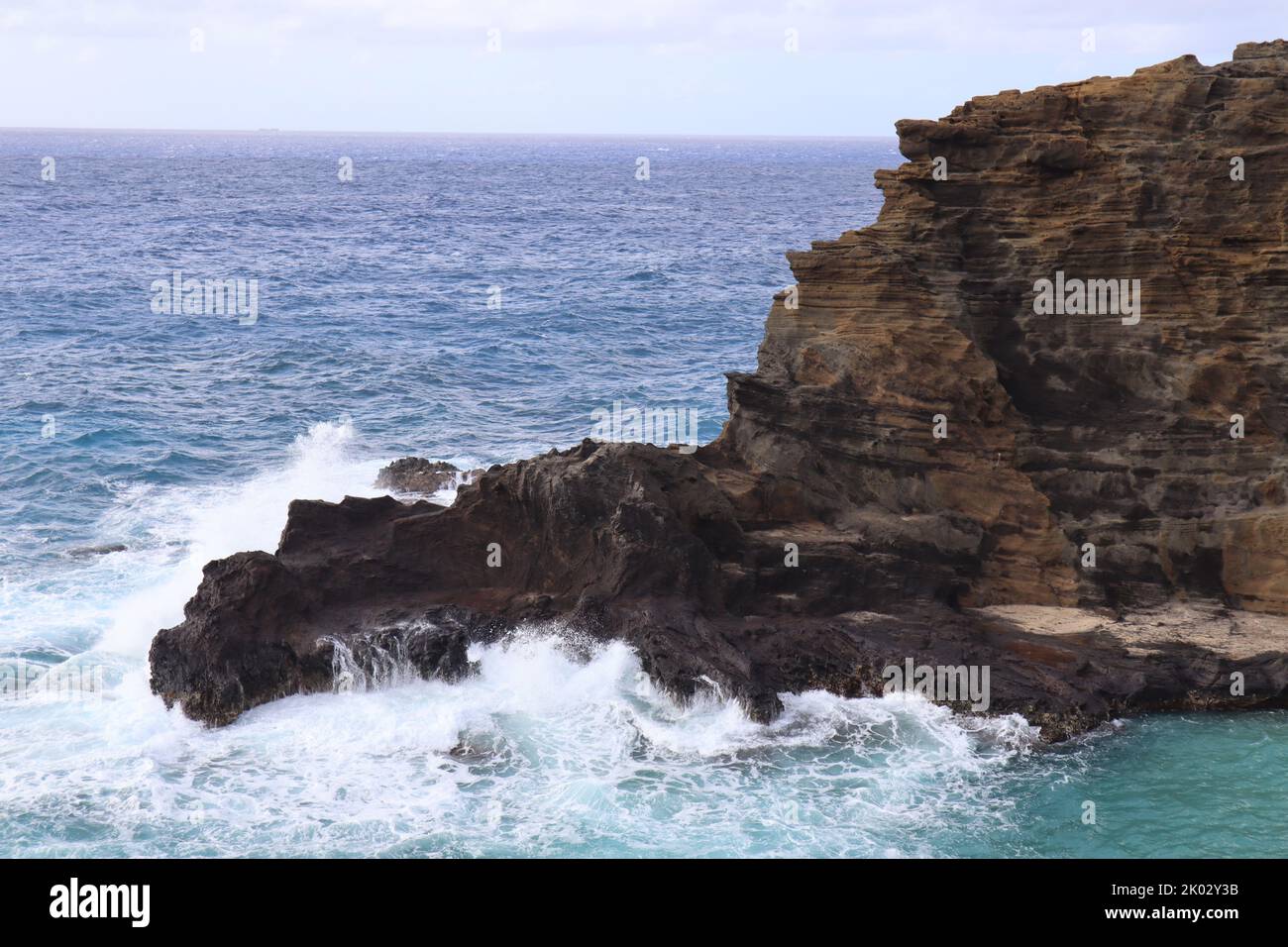 The huge rock formation on Hawaiian island near the Pacific Ocean Stock ...
