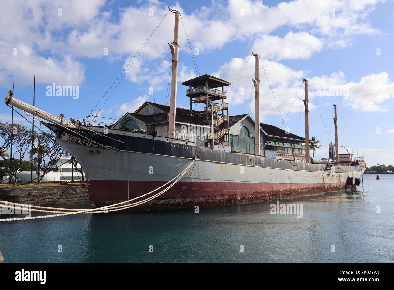 An old ship in a harbor of Honolulu on the Hawaiian island of Oahu ...