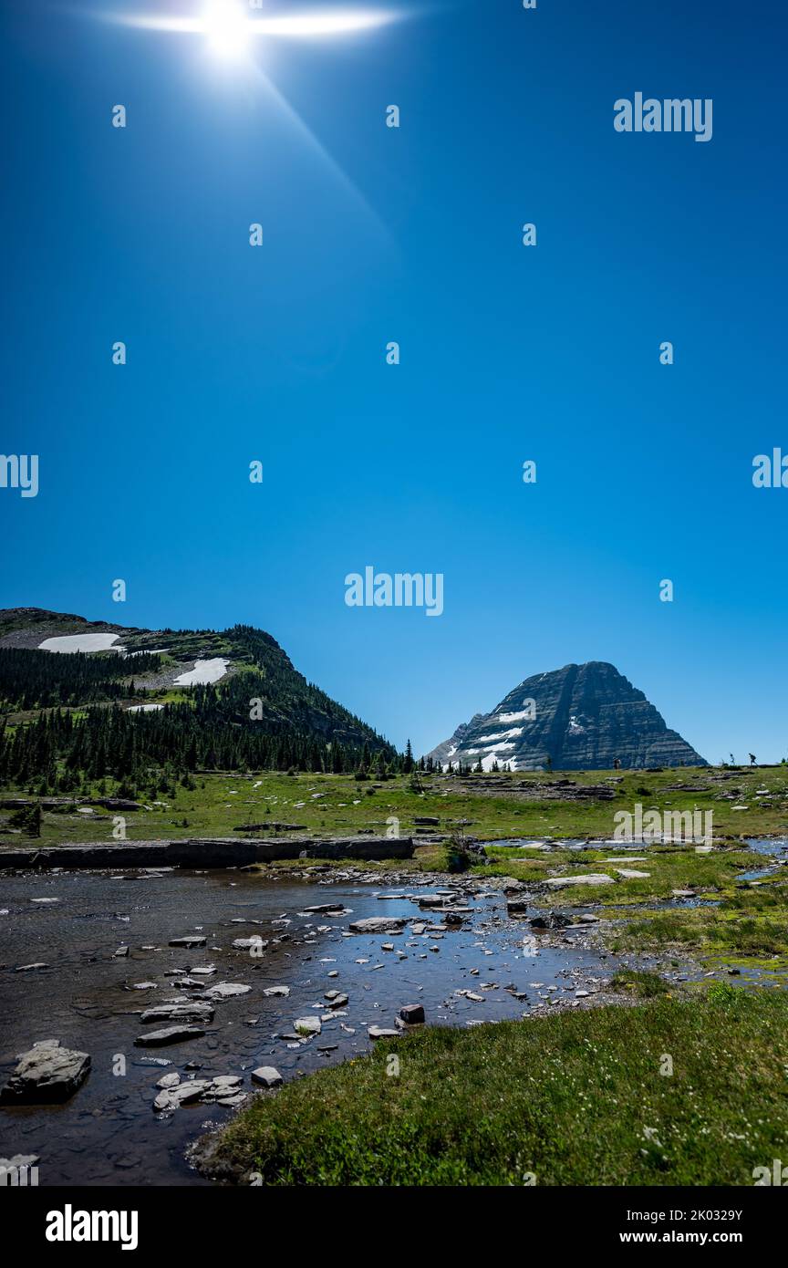 Snow-melt runoff along Logan Pass trail to Hidden Lake at Glacier ...
