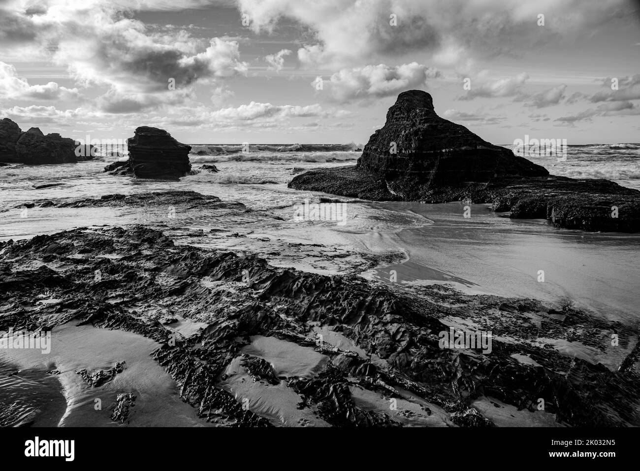 A black and white of a rocky beach Stock Photo - Alamy