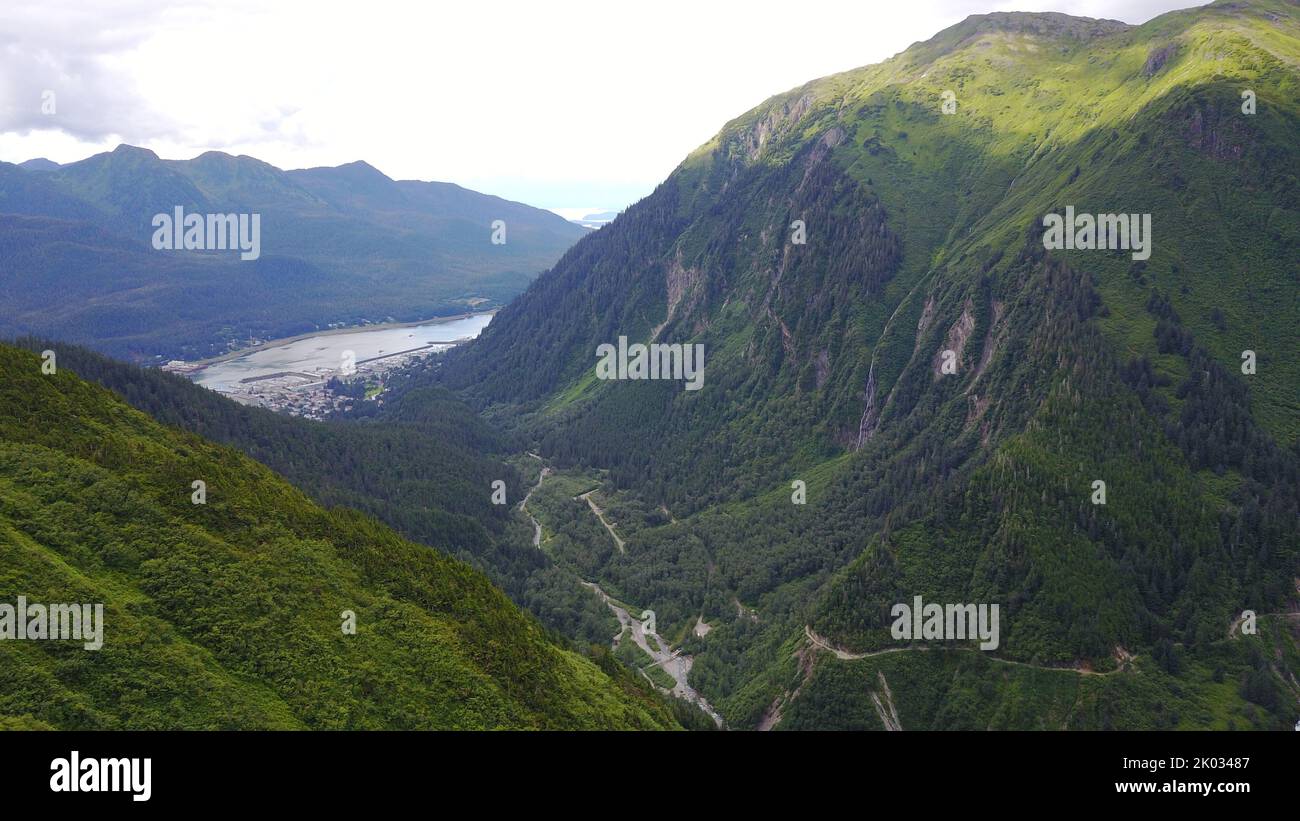A scenic shot of a water path leading to a river in the valley of ...