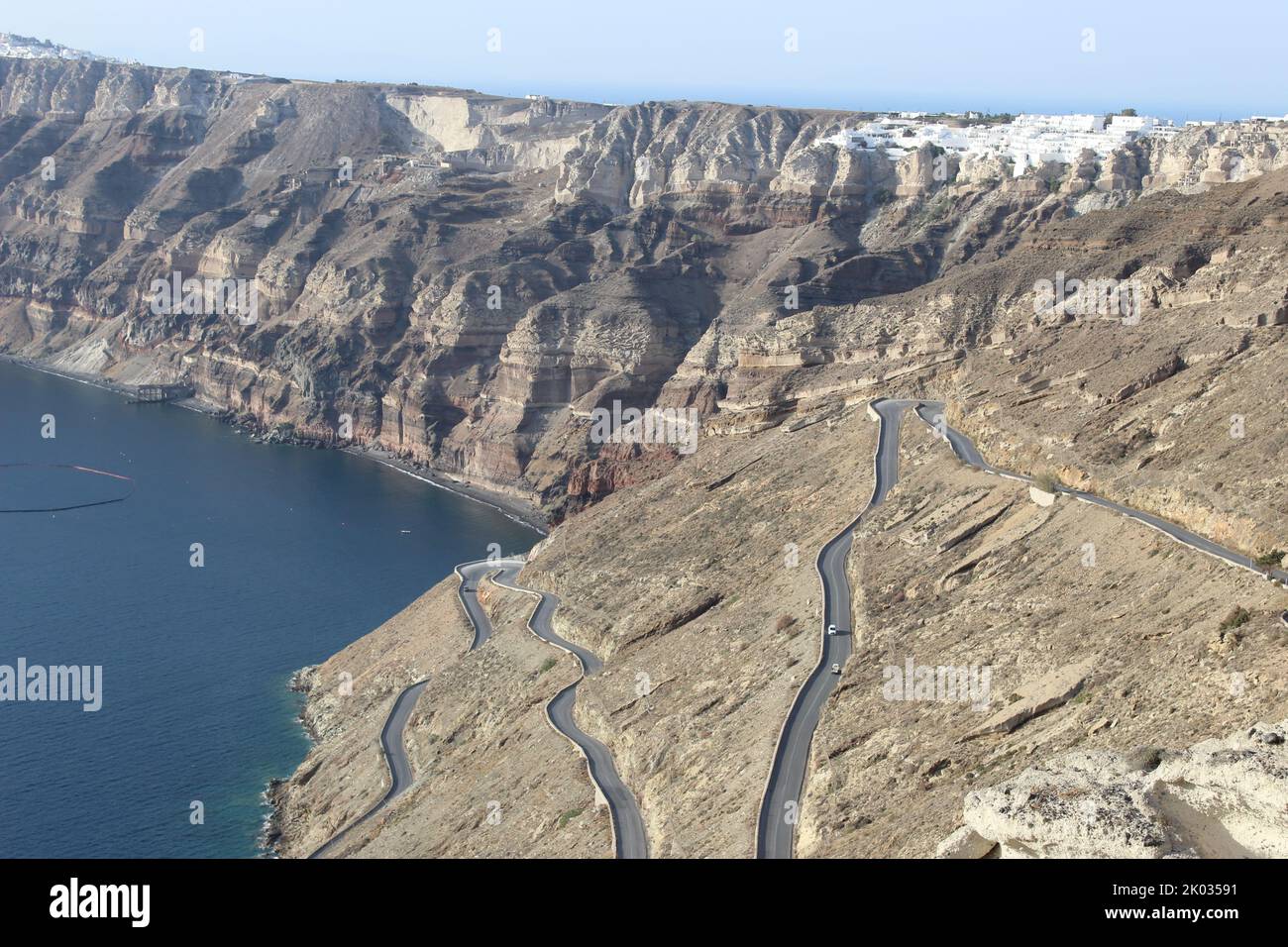 A birds eye view of a tall coastal cliff with roads and highway Stock ...