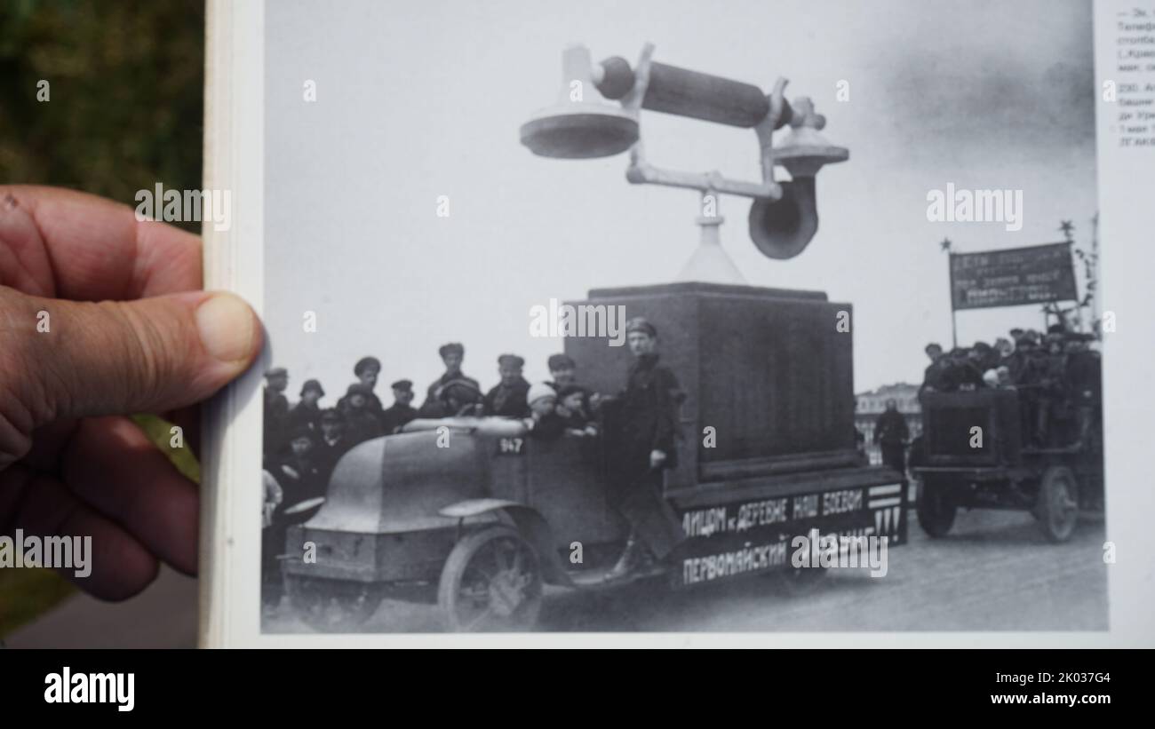 A propaganda car with a mock-up of a telephone at a demonstration in ...