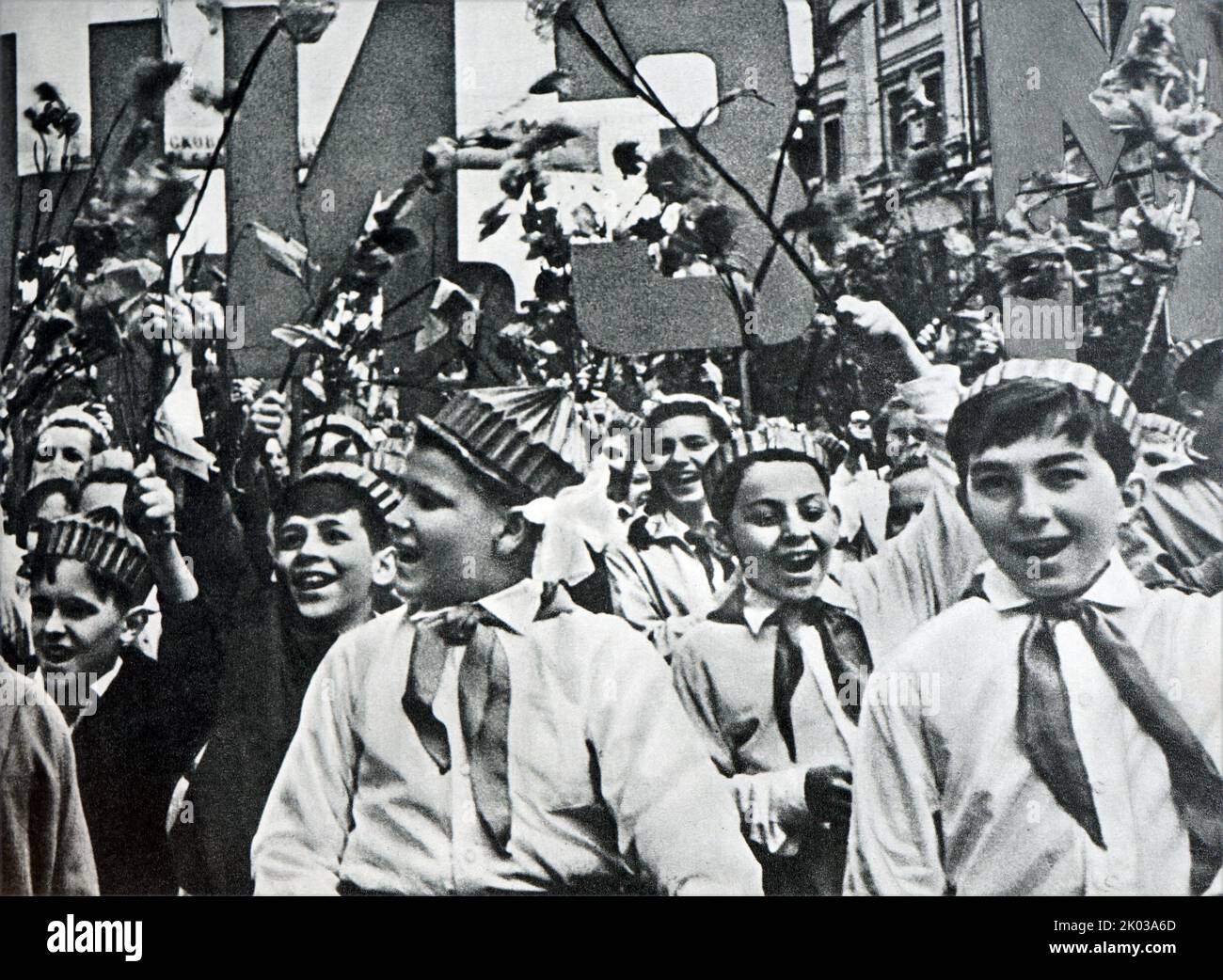 Propaganda photograph of soviet Russian children at a public parade ...