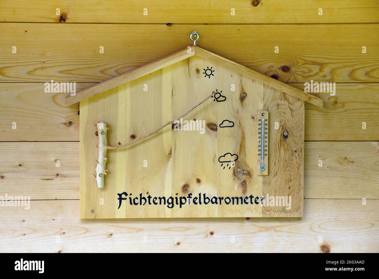 Spruce summit barometer on wooden wall in the South Tyrolean Ulten ...