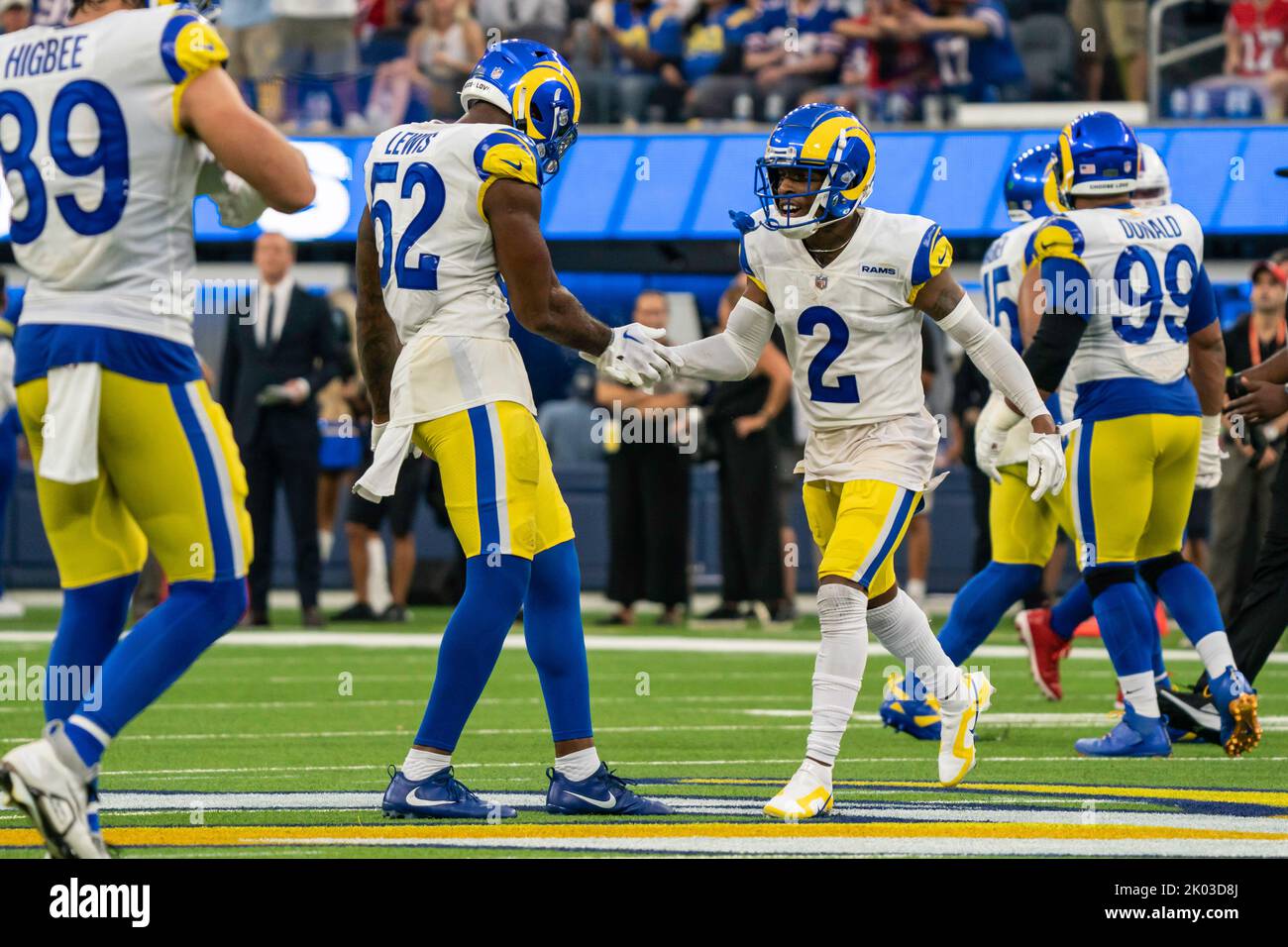 Los Angeles Rams linebacker Terrell Lewis (52) and cornerback Troy Hill ...