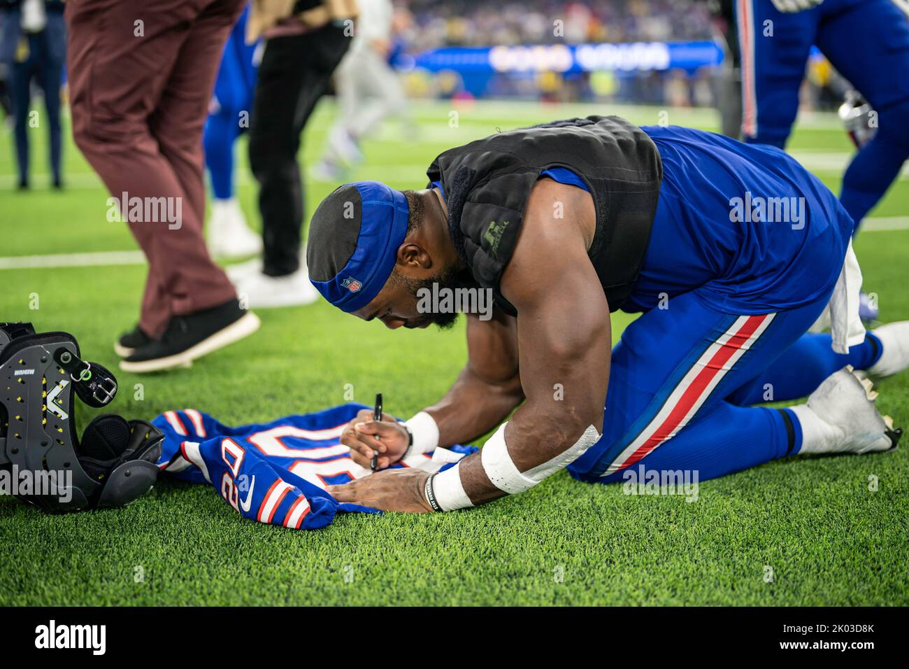 Buffalo Bills running back Zack Moss (20) signs his jersey after a NFL ...