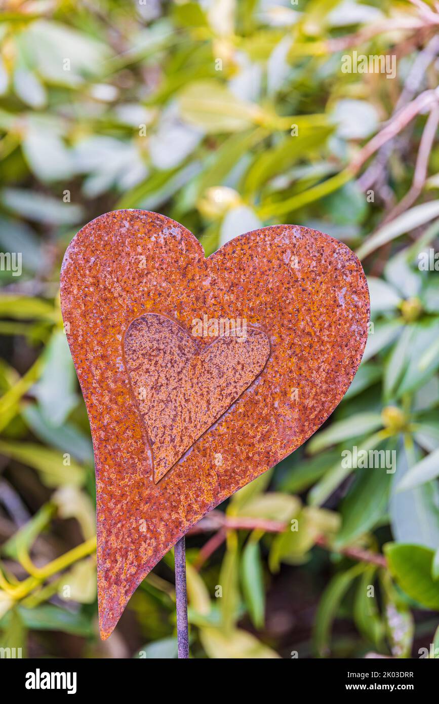 Heart shaped metal garden plug hi-res stock photography and images - Alamy