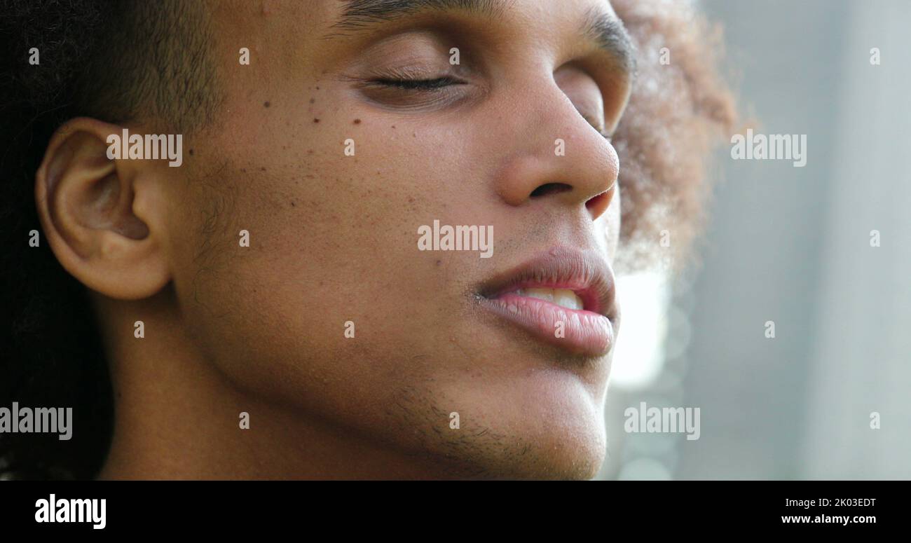 African american black man face opening eyes smiling feeling happy and ...