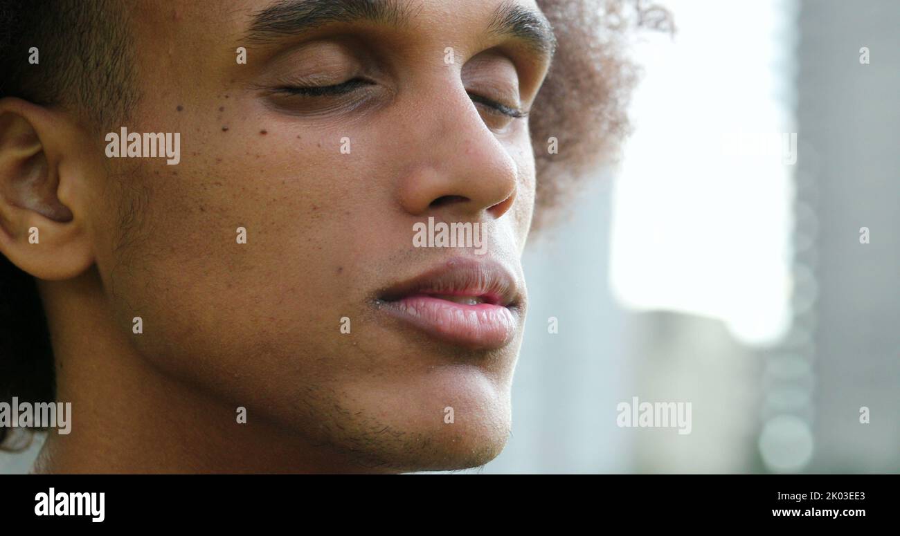 African american black man face opening eyes smiling feeling happy and ...