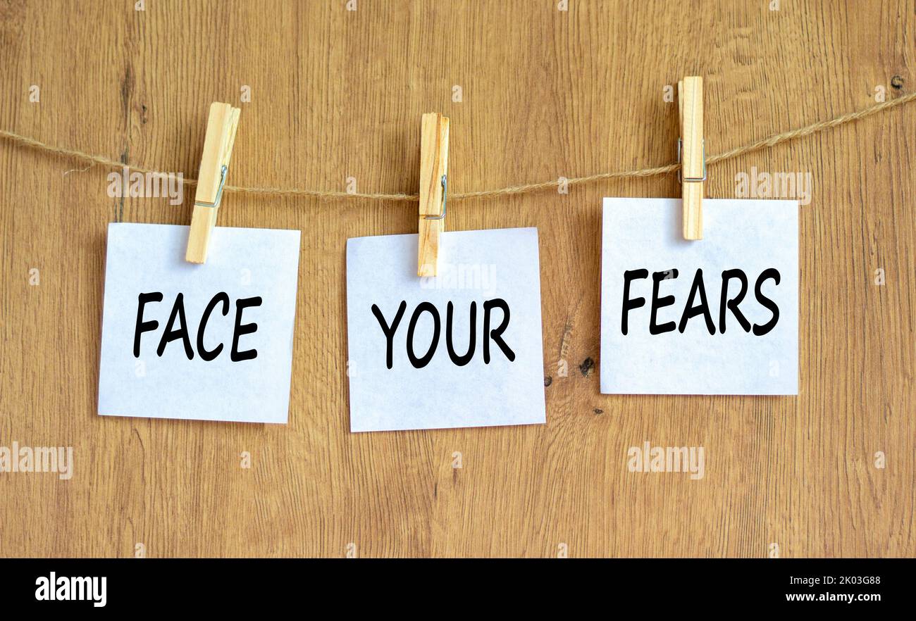 Face your fears and support symbol. Concept words Face your fears on ...