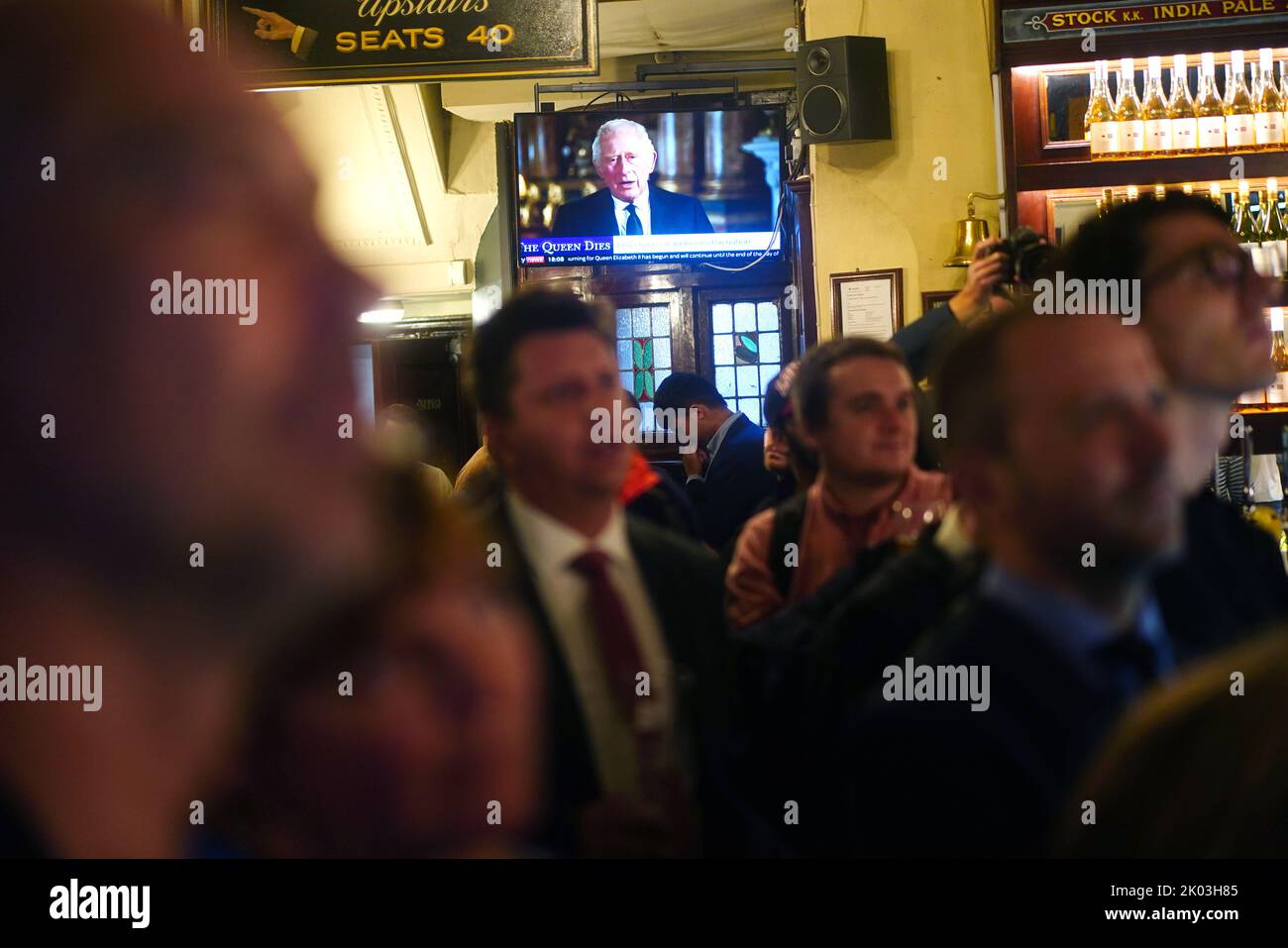 People in The Westminster Arms pub in central London, watching King ...