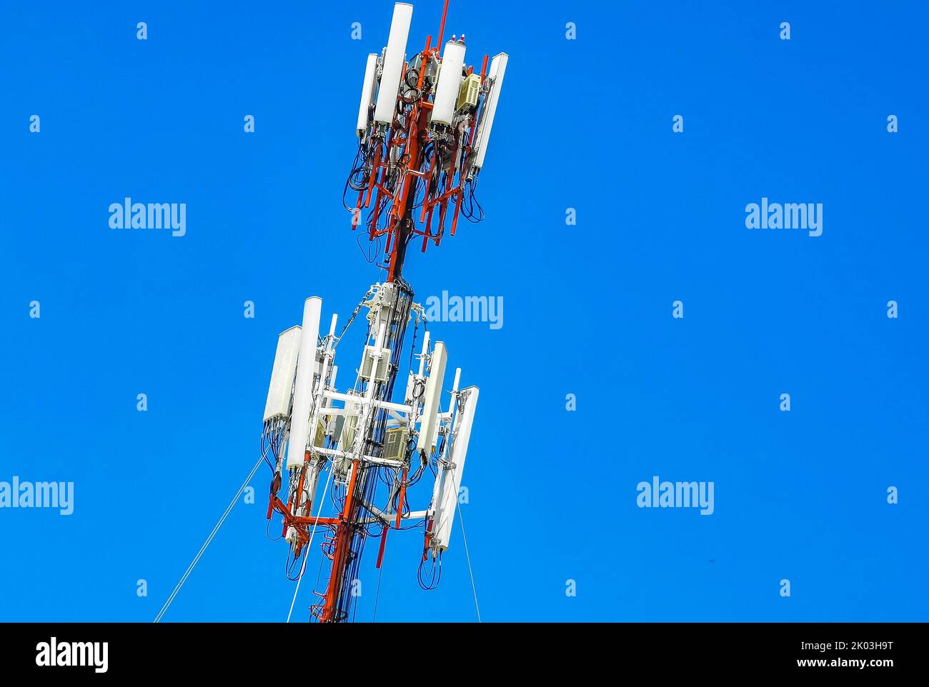 Red white 5G tower with blue sky background radiation kills us in Playa ...