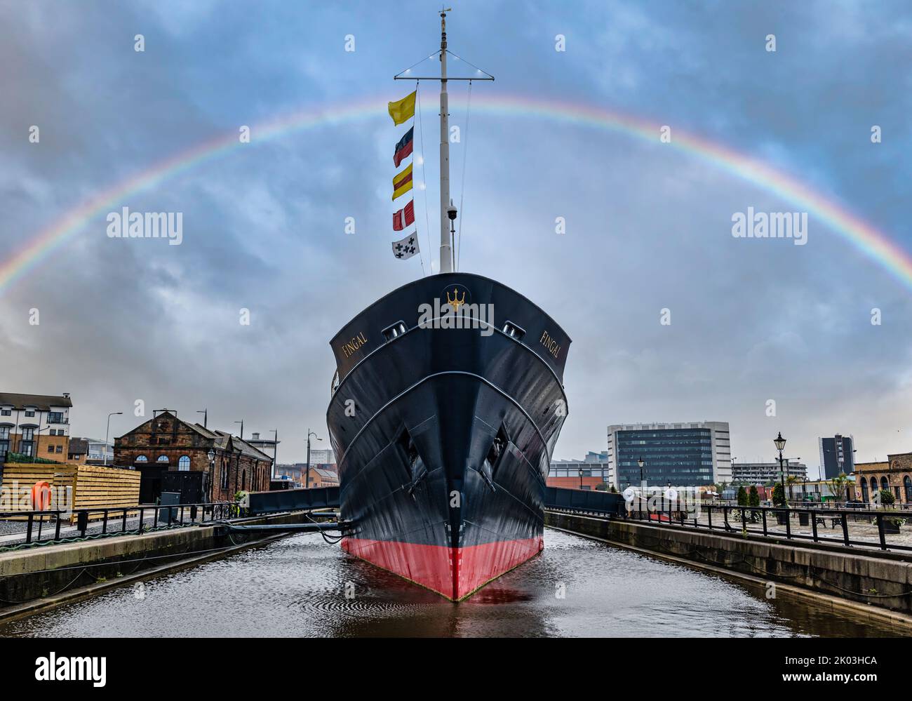 Bow of floating hotel ship Fingal with overarching rainbow, Leith ...