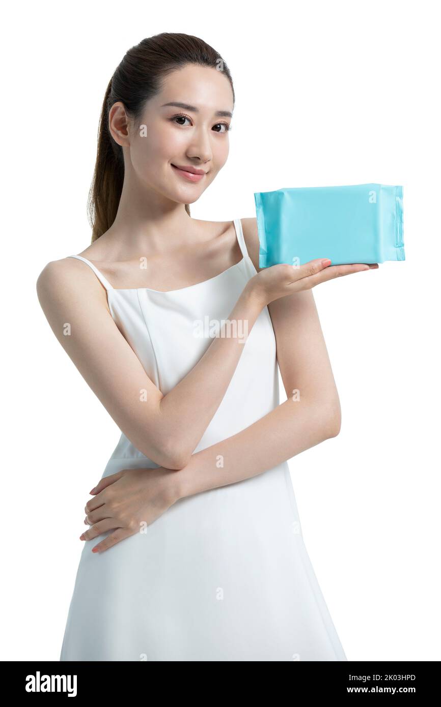 Beautiful young Chinese woman showing wet wipe Stock Photo - Alamy