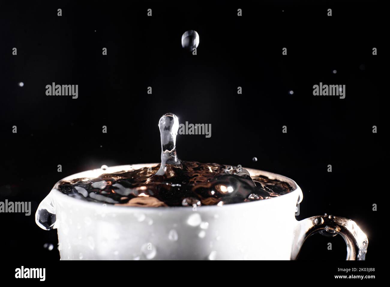 Drop falls blue water black hi-res stock photography and images - Alamy