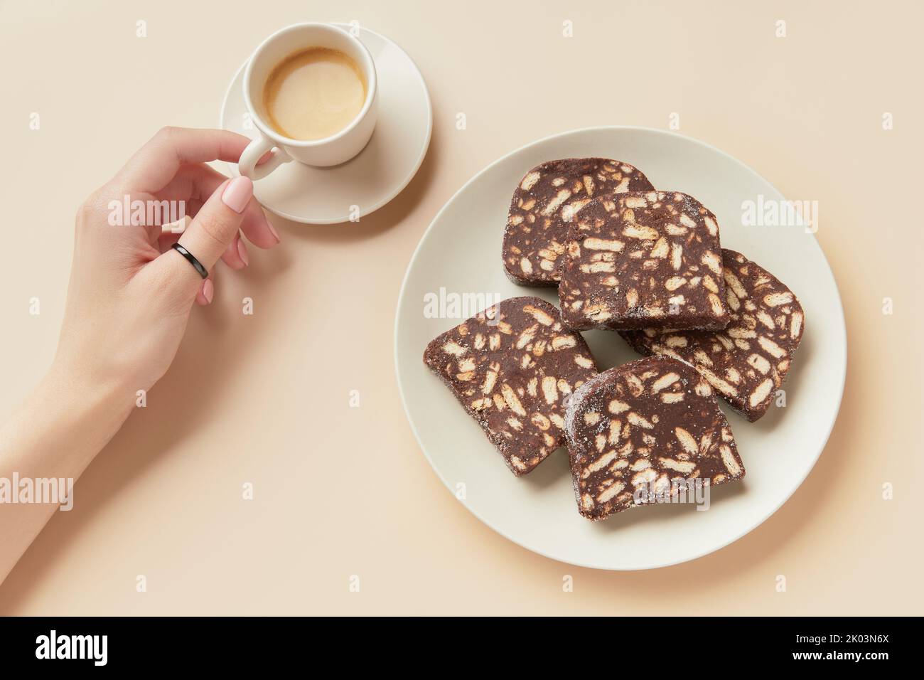 Traditional portuguese dessert Salame de Chocolate on beige background ...