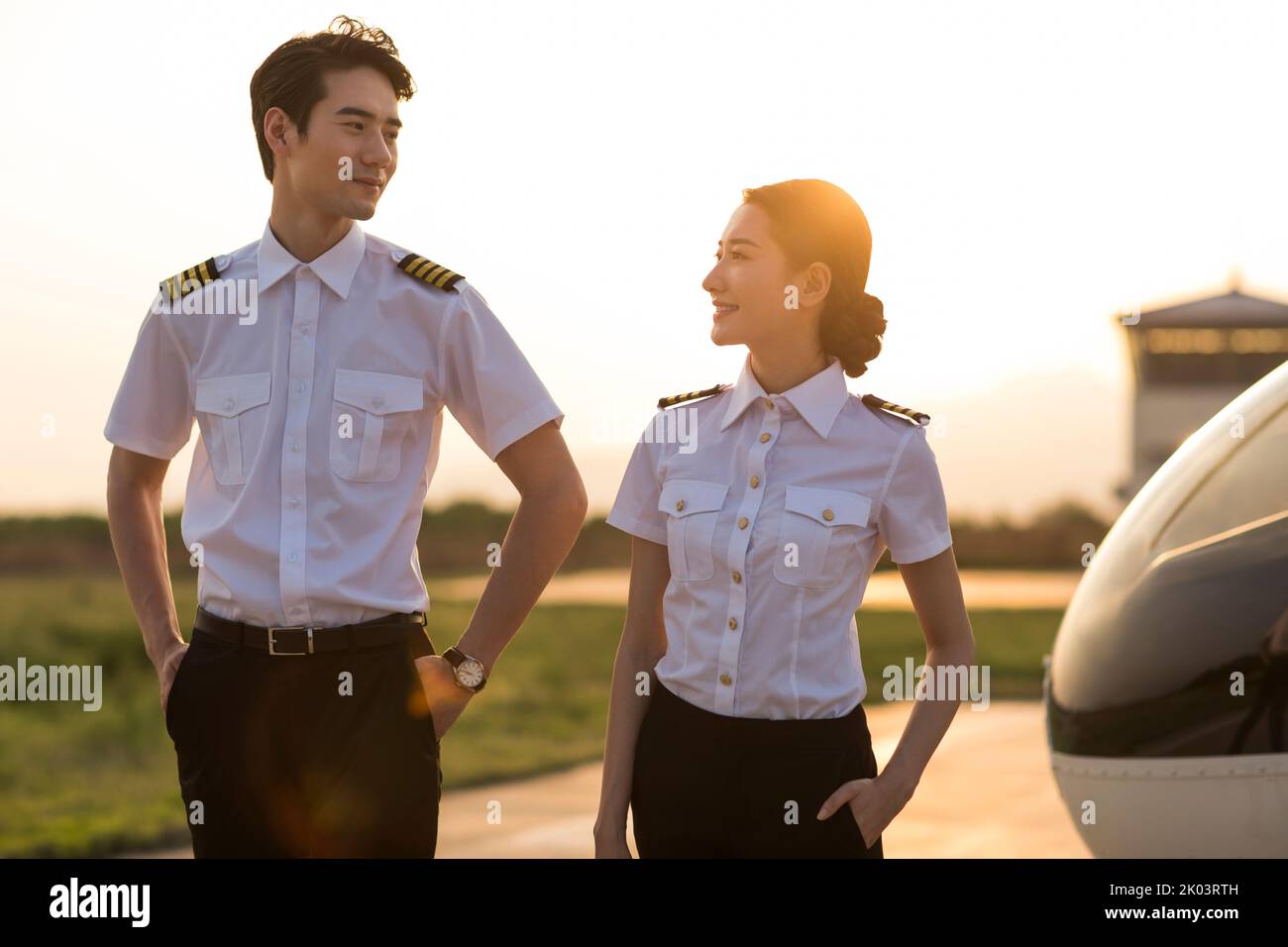 Chinese helicopter pilots standing by the vehicle Stock Photo - Alamy