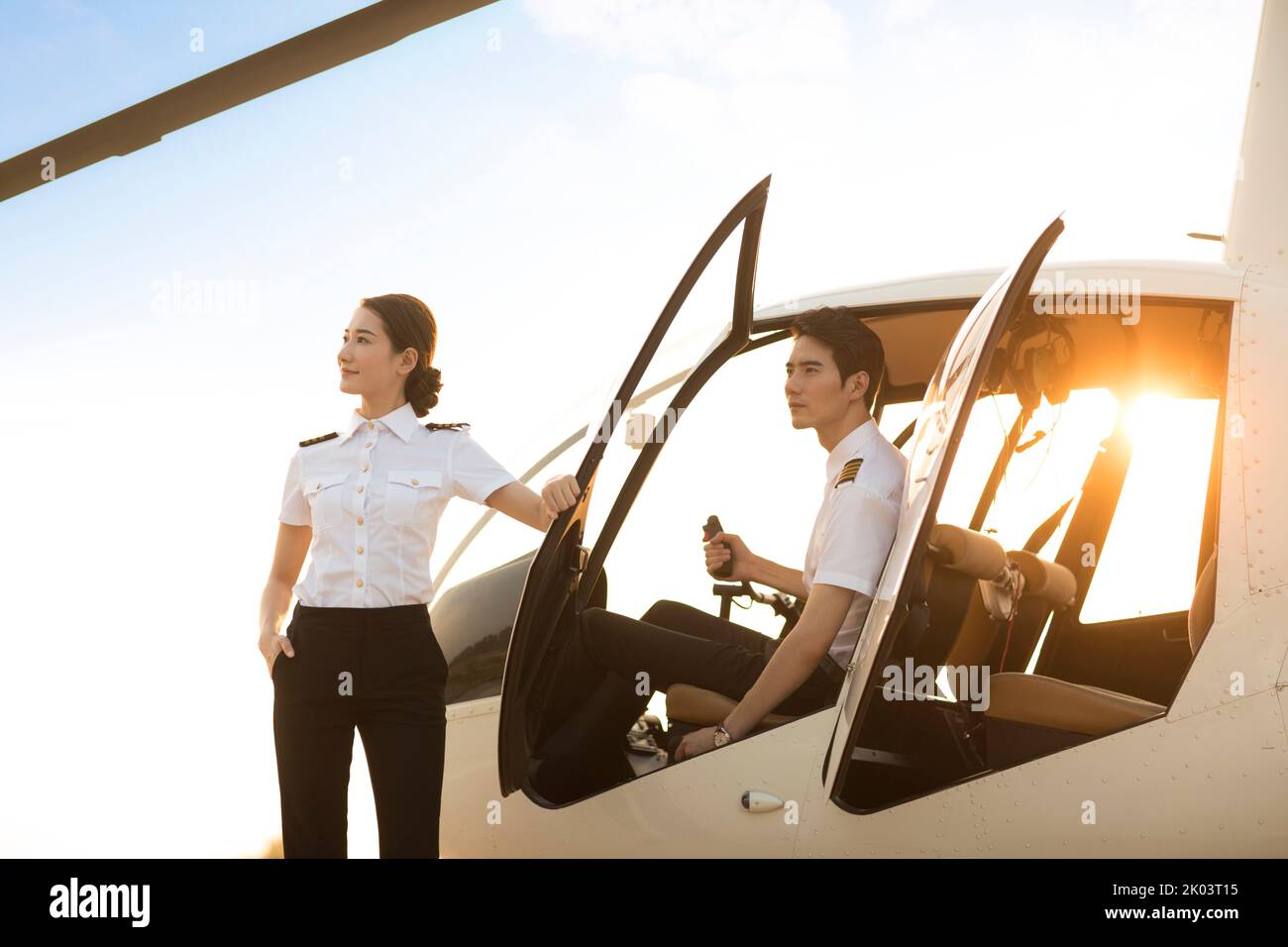 Helicopter pilot smiling hi-res stock photography and images - Alamy