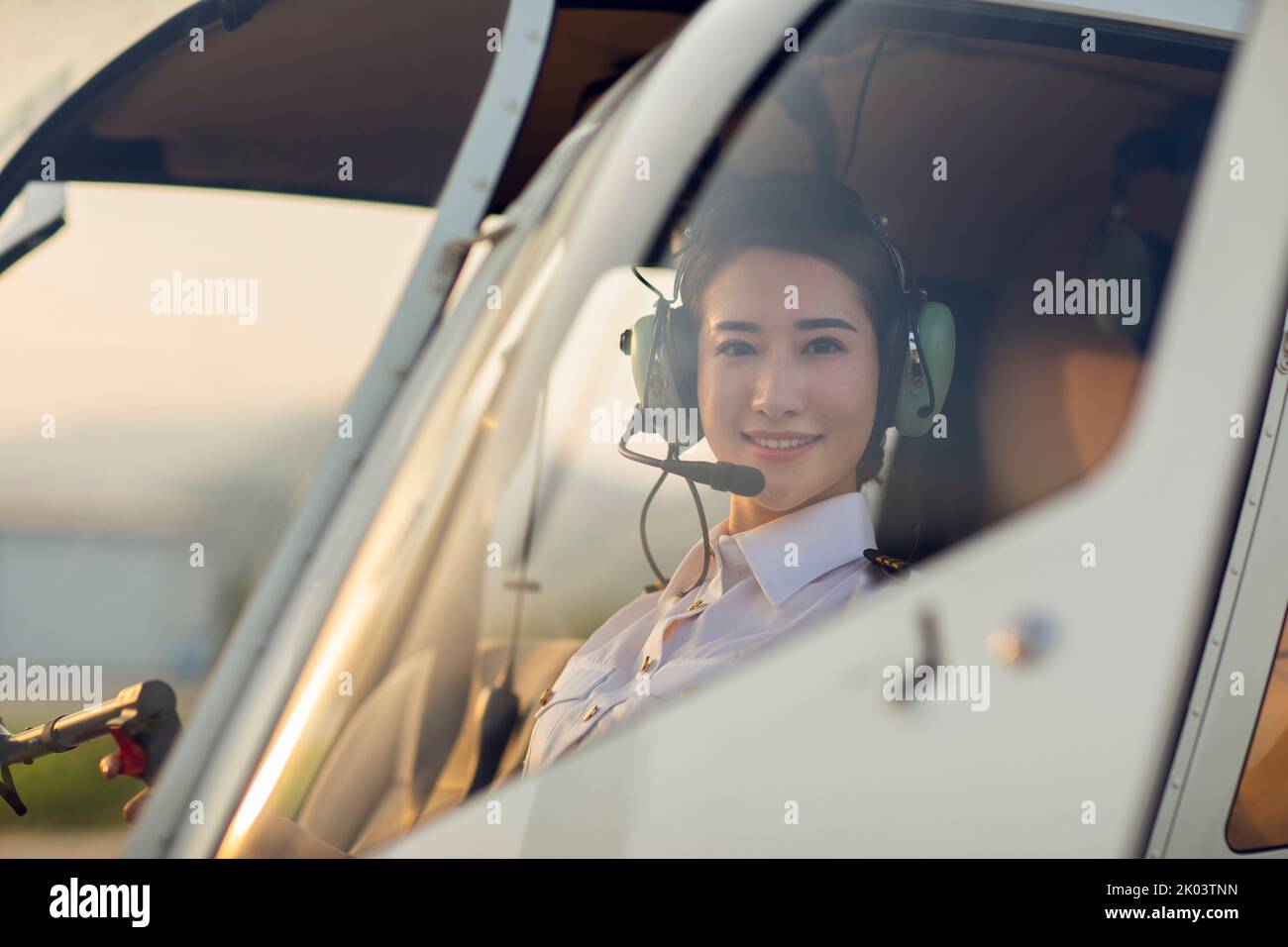 Chinese pilot sitting in helicopter cockpit Stock Photo - Alamy