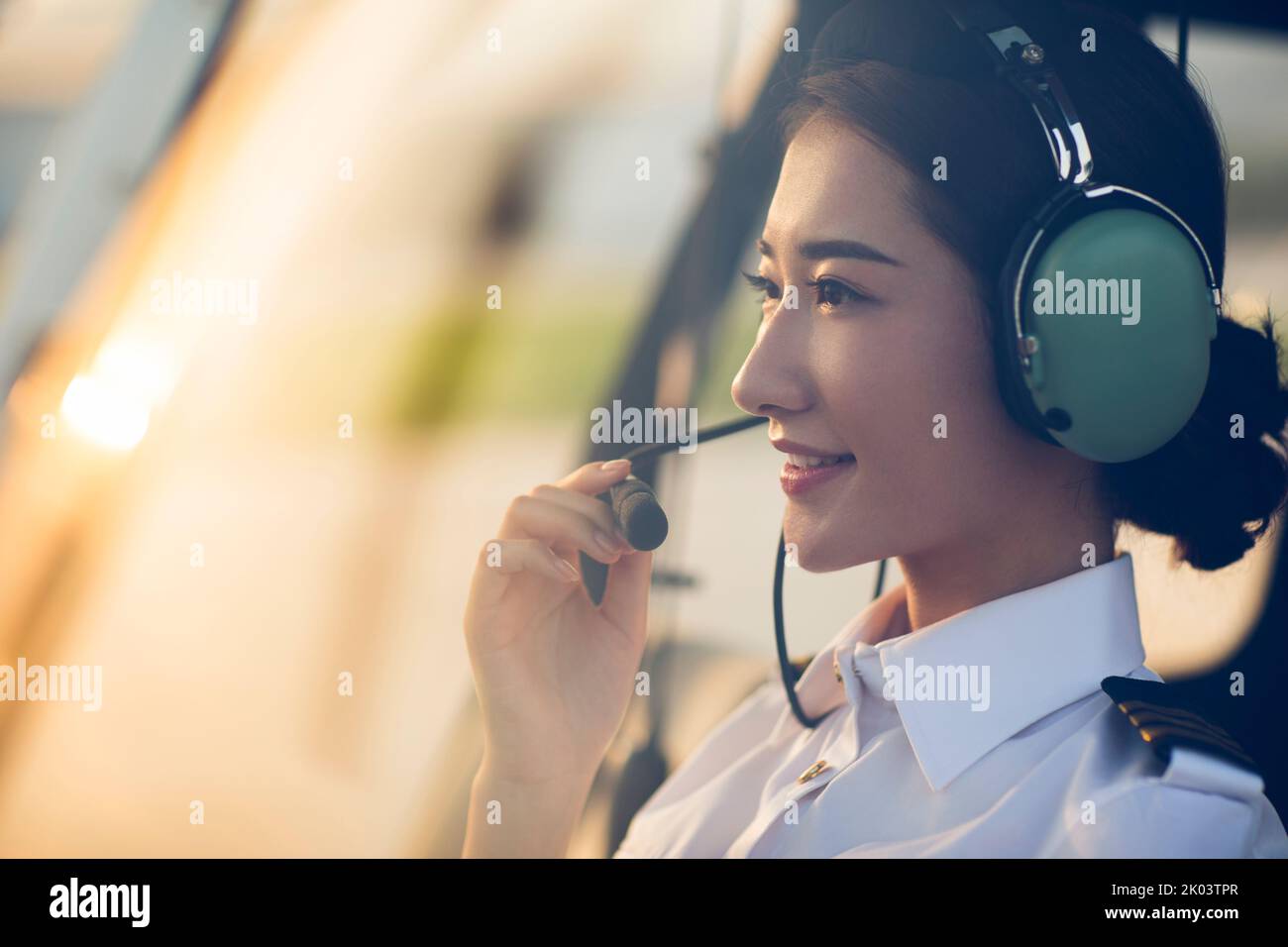 Chinese pilot sitting in helicopter cockpit Stock Photo - Alamy