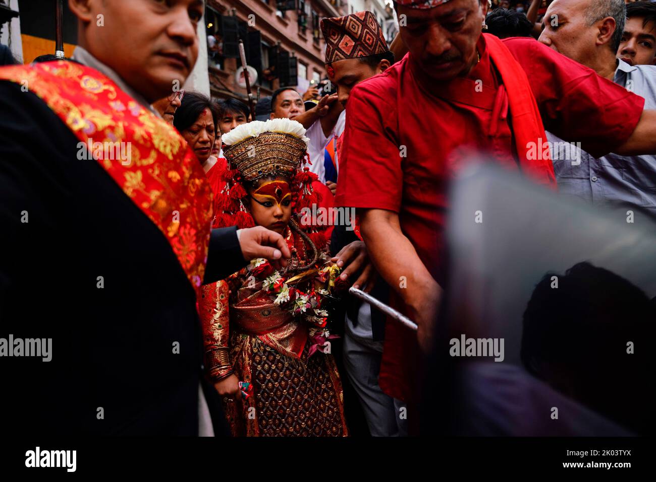 Nepal’s Living Goddess Kumari is taken to her chariot by caretakers ...