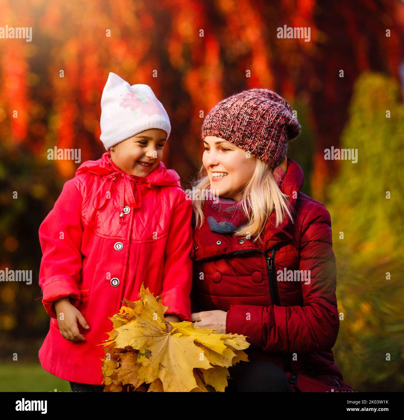 Colorful autumn leaves, happy family Stock Photo - Alamy