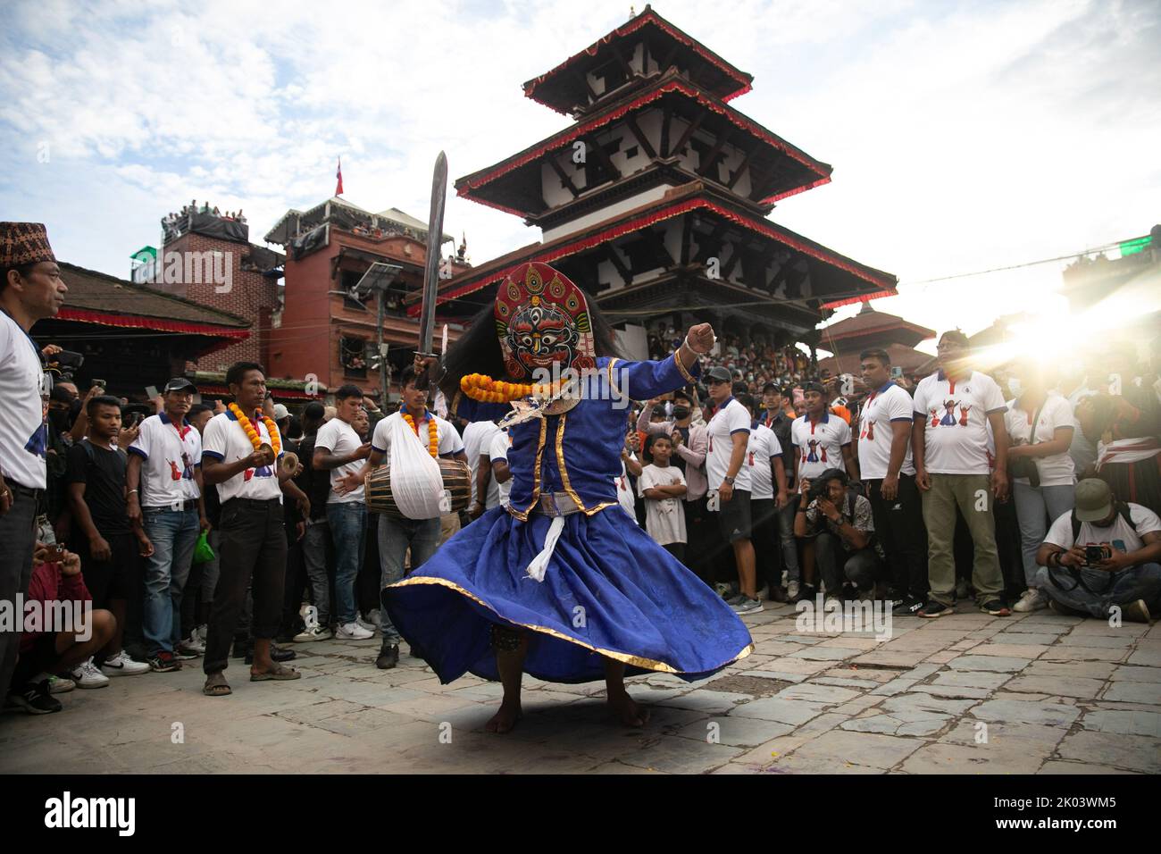 Kathmandu, Nepal. 9th Sep, 2022. A Masked dancer performs during a ...