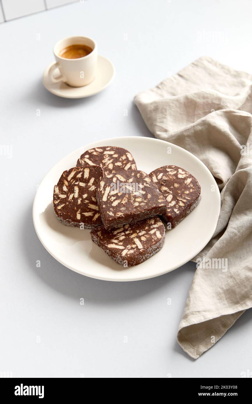 Traditional portuguese dessert Salame de Chocolate on beige background ...