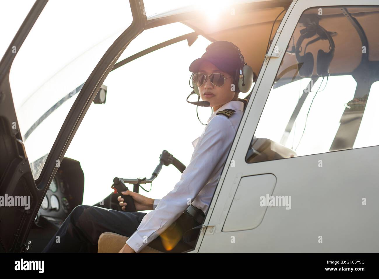 Chinese pilot sitting in helicopter cockpit Stock Photo - Alamy