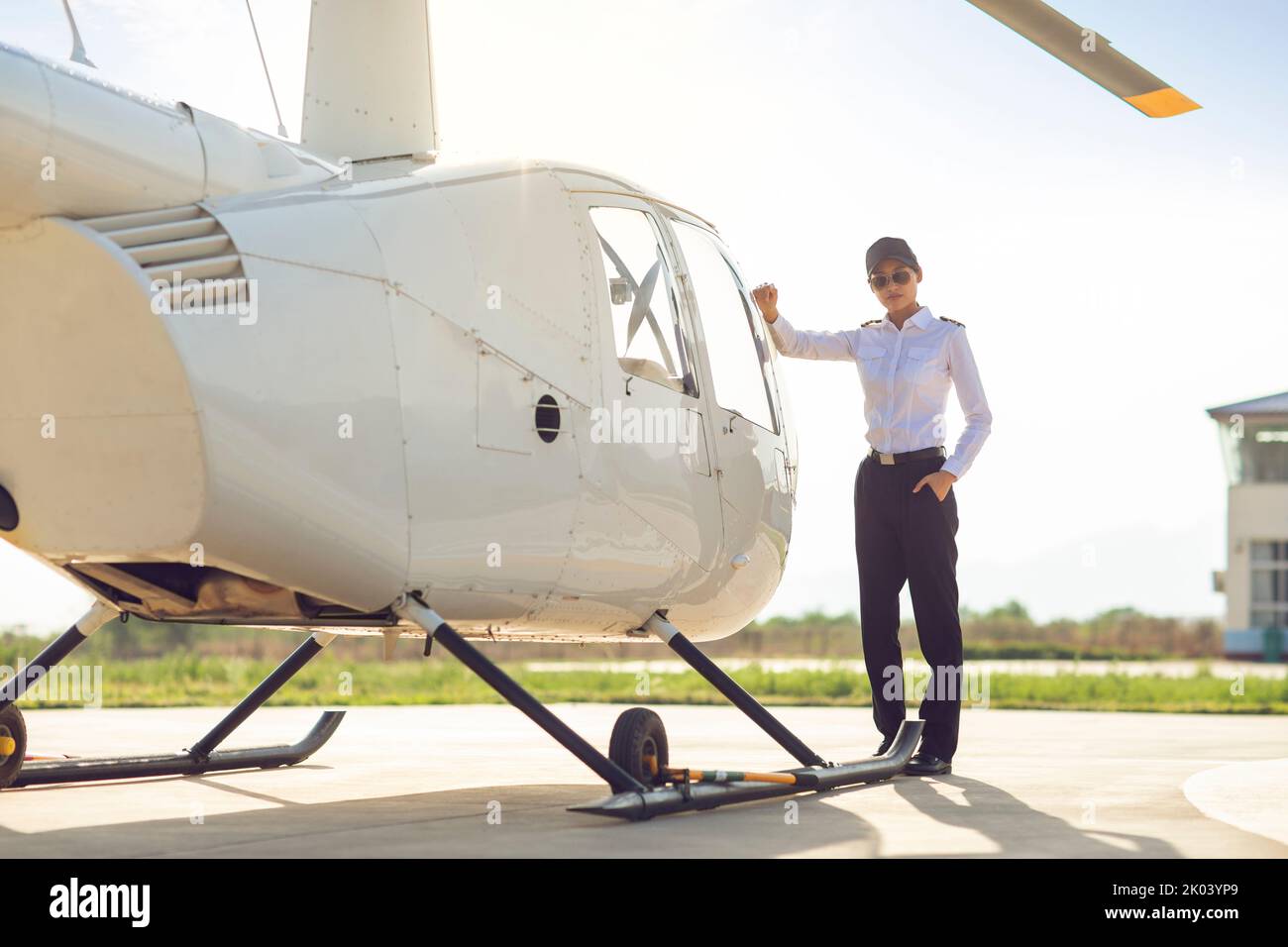 Chinese helicopter pilot standing by the vehicle Stock Photo - Alamy