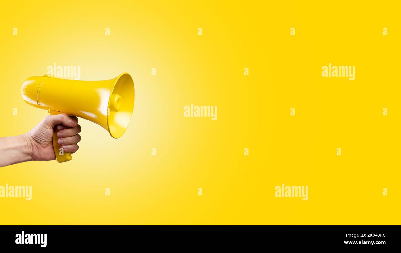 On a bright yellow background, a yellow megaphone. Election debates ...