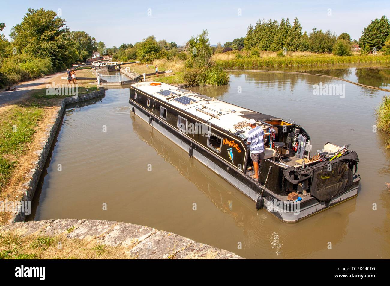 Canal narrowboats at Caen Hill Locks, a flight of 29 locks on the ...
