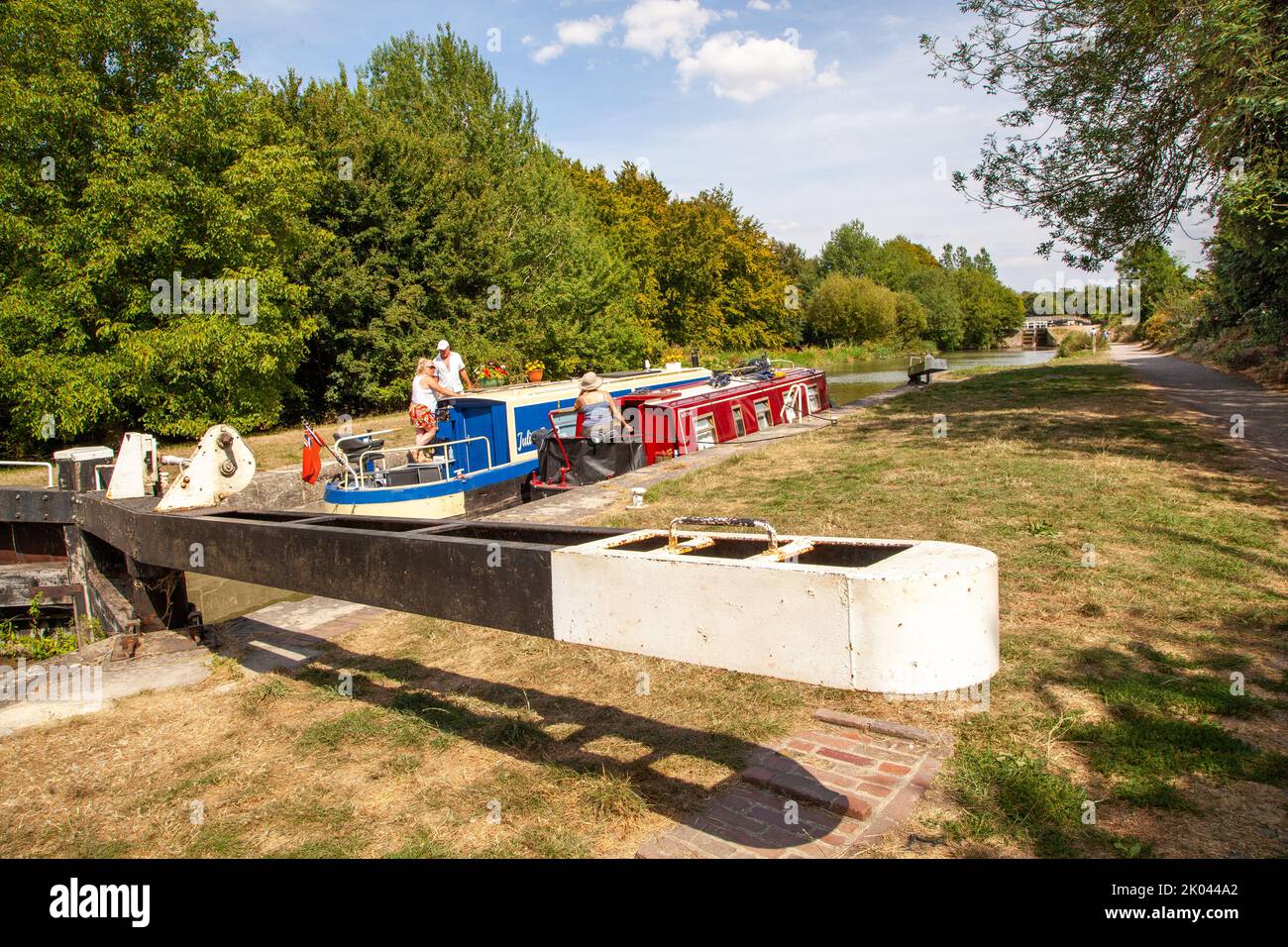 Canal narrowboats at Caen Hill Locks, a flight of 29 locks on the ...