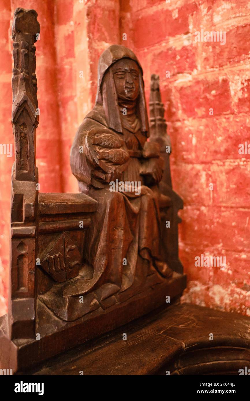 Carved wooden figures on Gothic choir stalls, Nikolaikirche (Church of ...