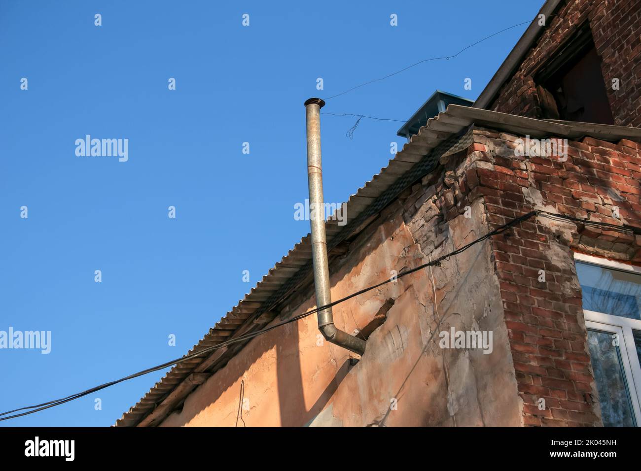 Extract from the pipe on the wall of the house. Preparing your home for ...