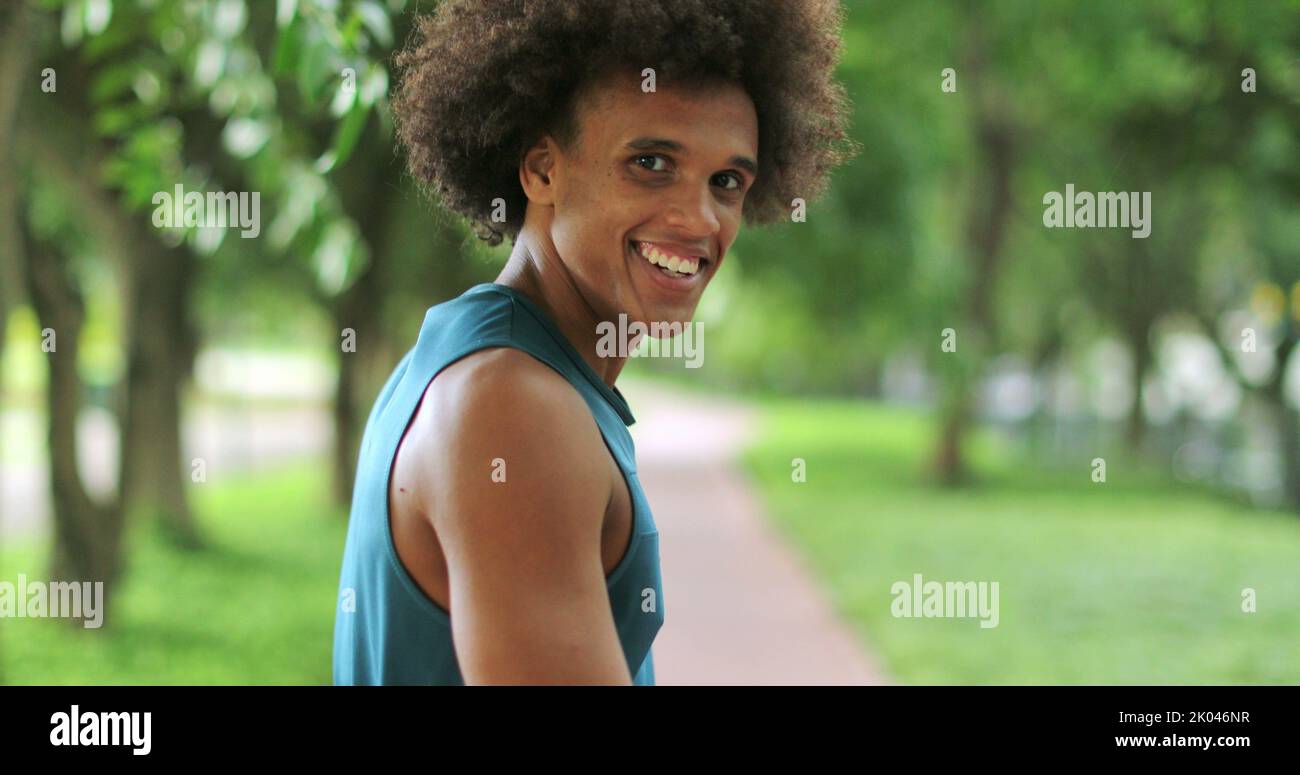Back of handsome african black man turning around and smiling Stock ...