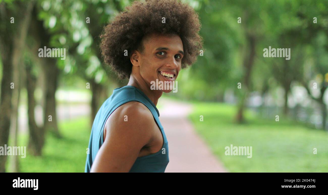 Handsome young man turning around hi-res stock photography and images ...