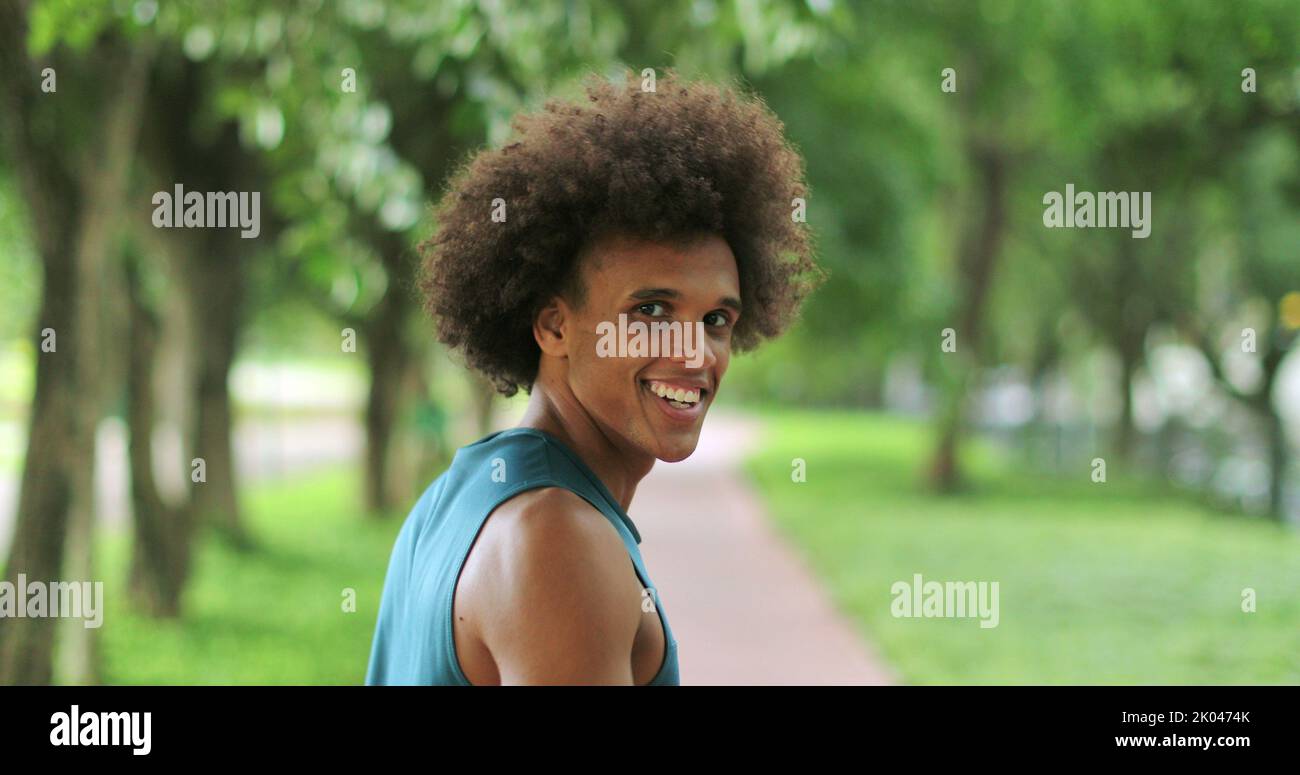 Back of handsome african black man turning around and smiling Stock ...