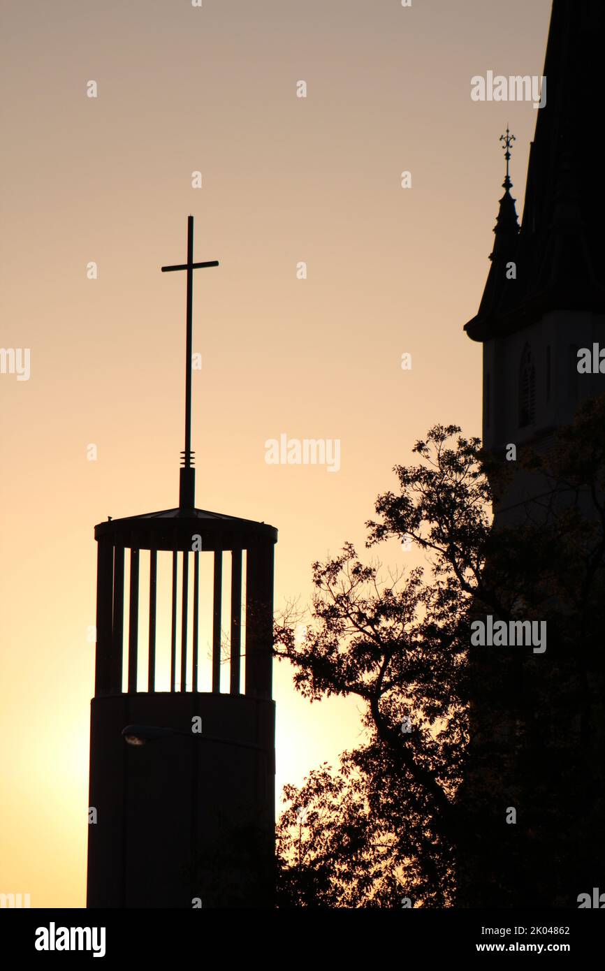 Sunset behind a church tower Stock Photo - Alamy