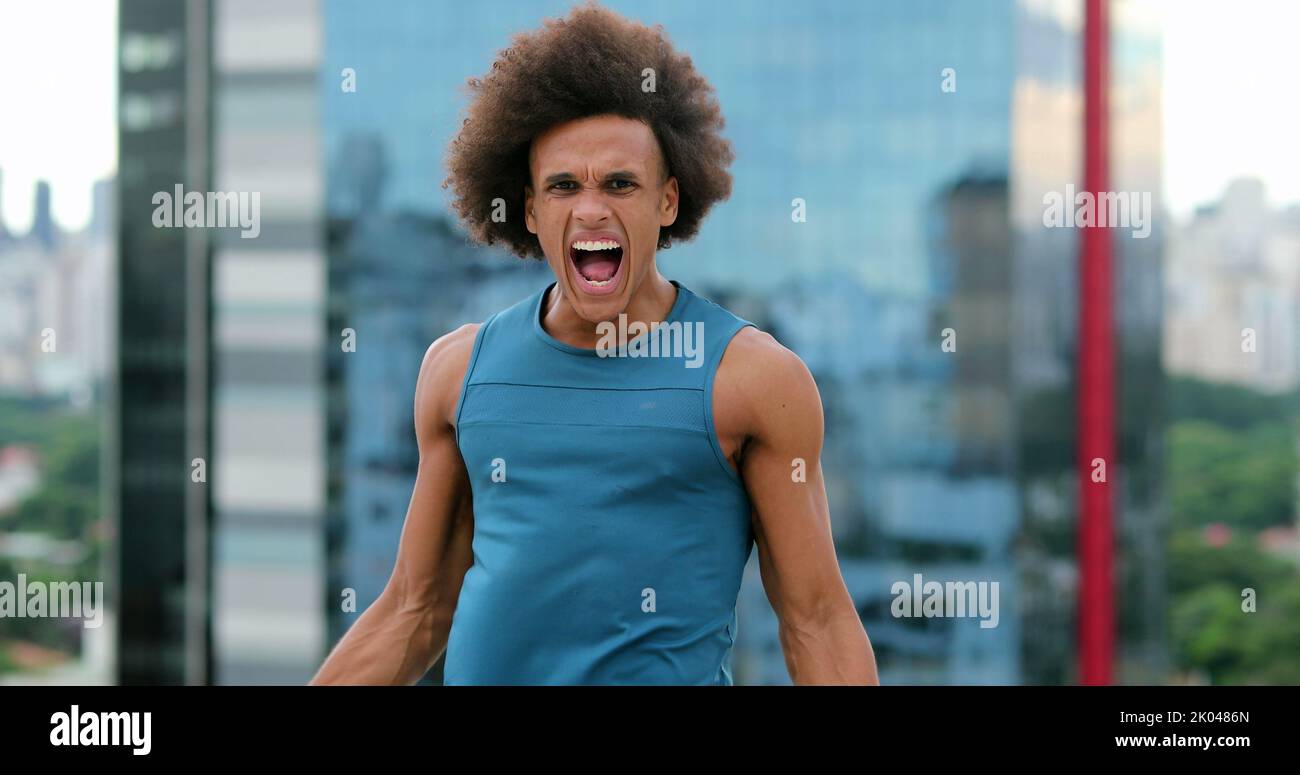 Furious African man shouting feeling angry Stock Photo - Alamy