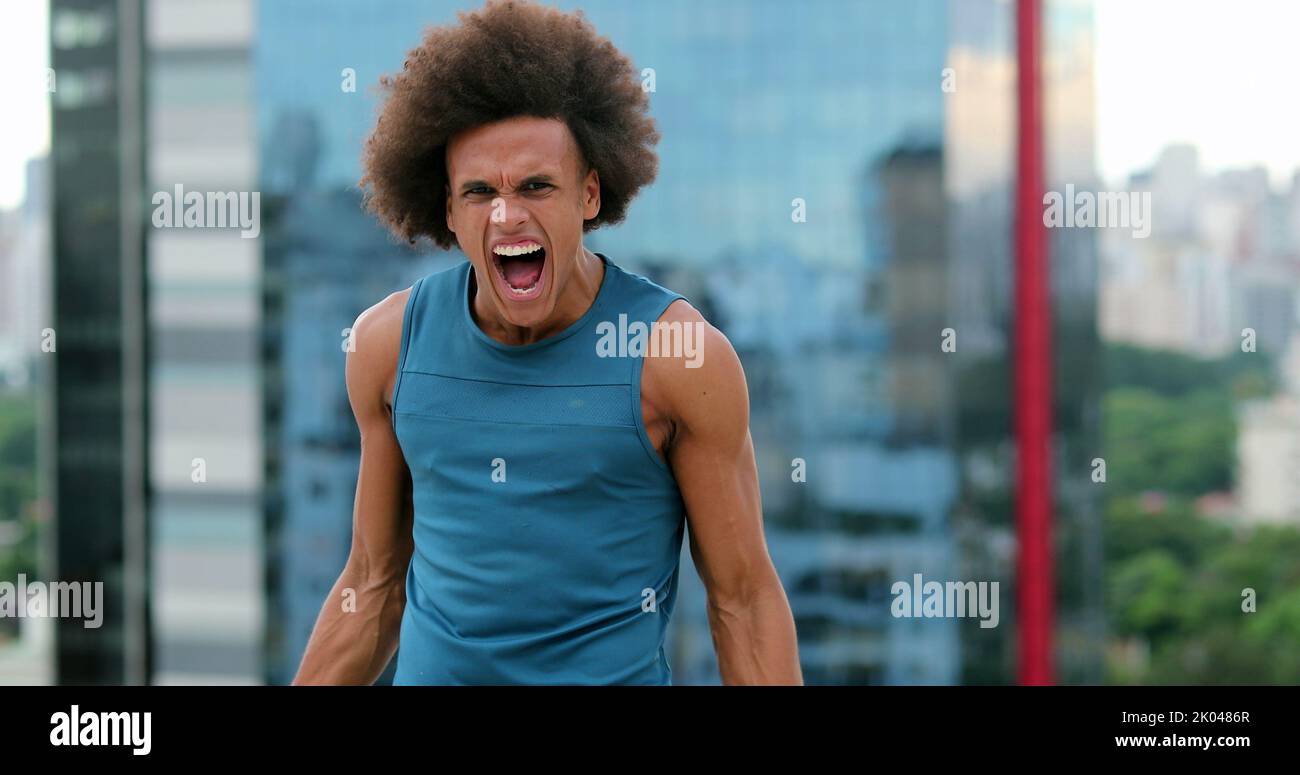 Furious African man shouting feeling angry Stock Photo - Alamy