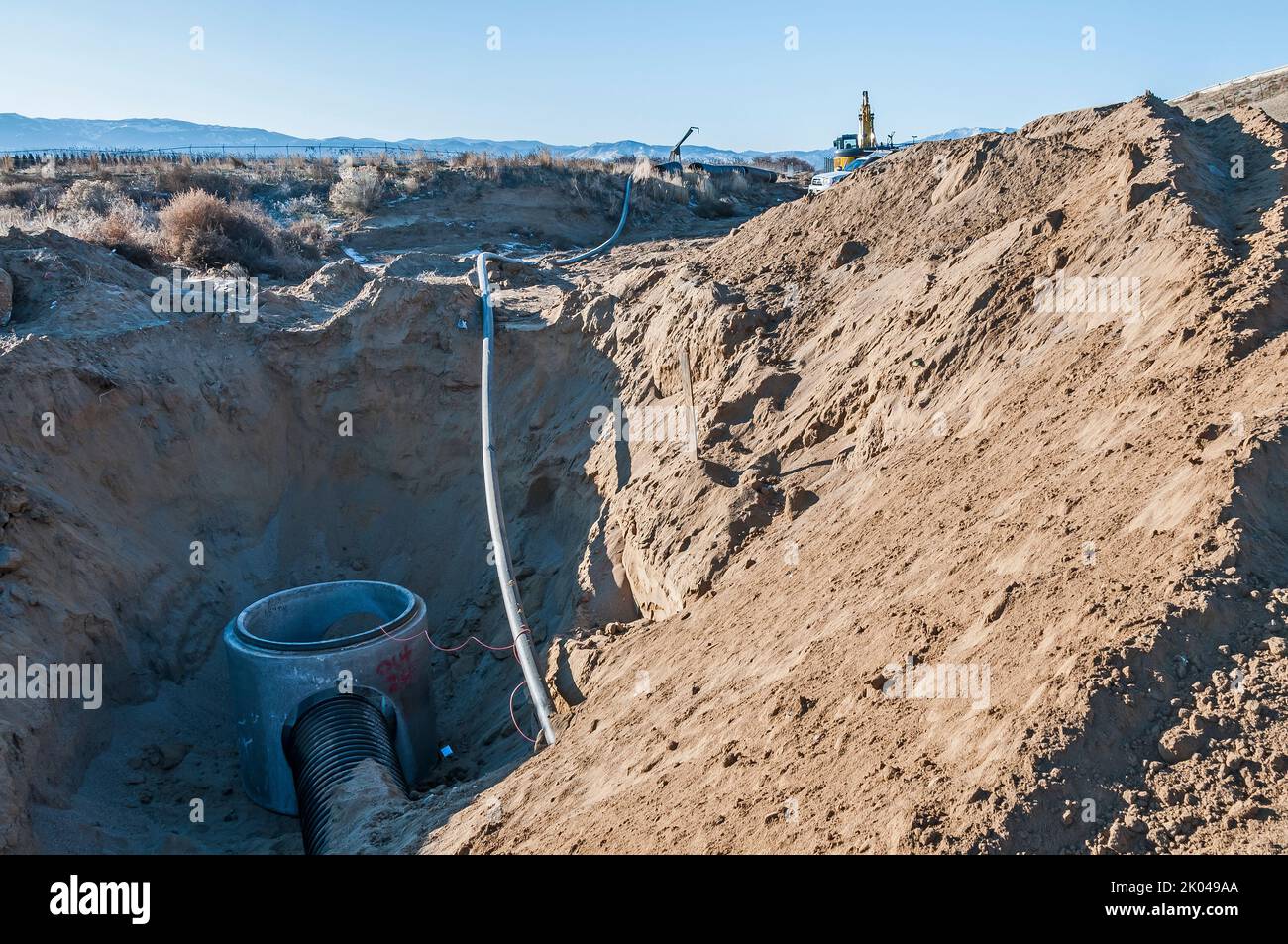An culvert or ditch being constructed or dug in an active solid-waste ...