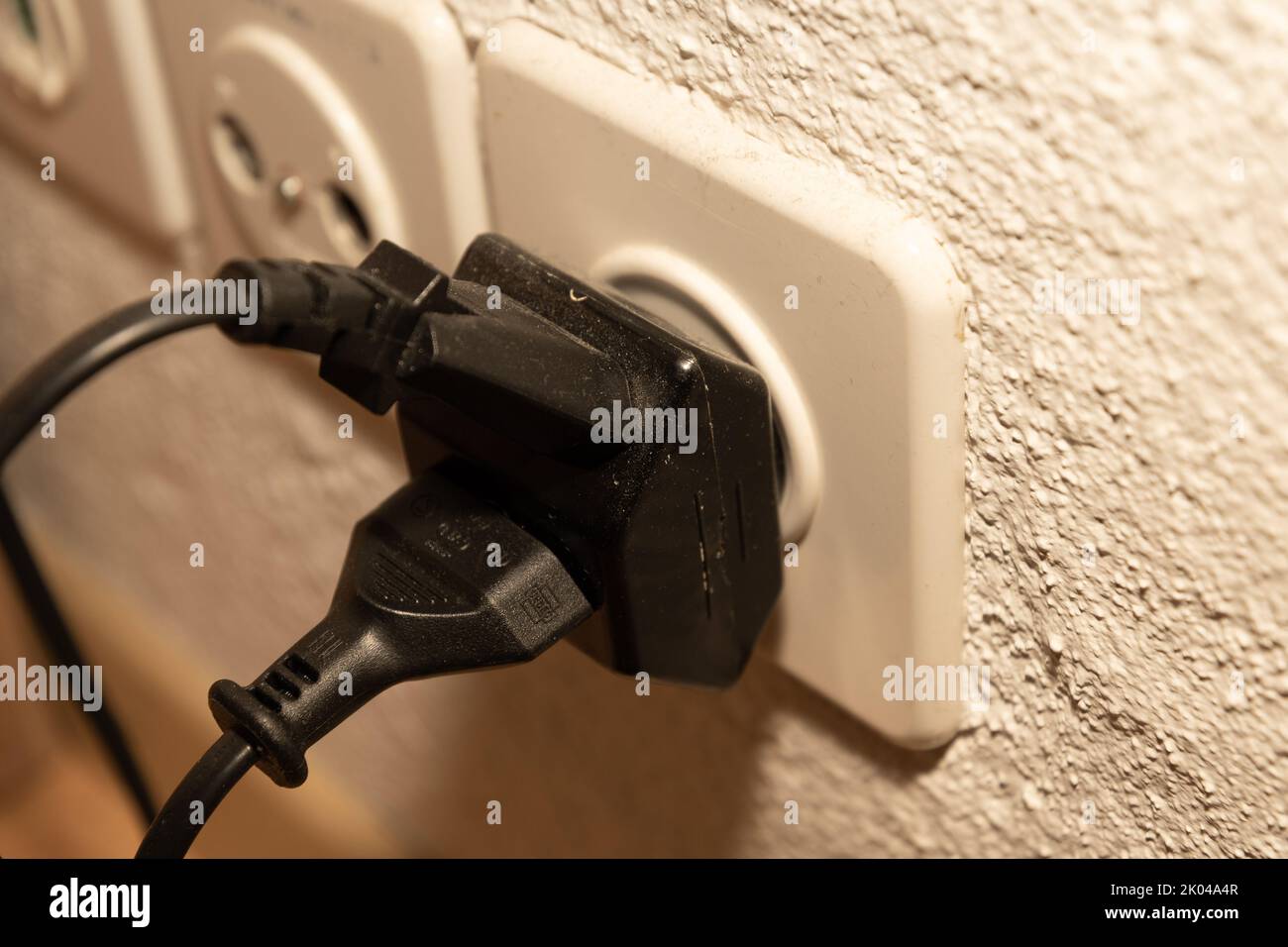 Vaduz, Liechtenstein, September 6, 2022 Electric power plug put in a ...