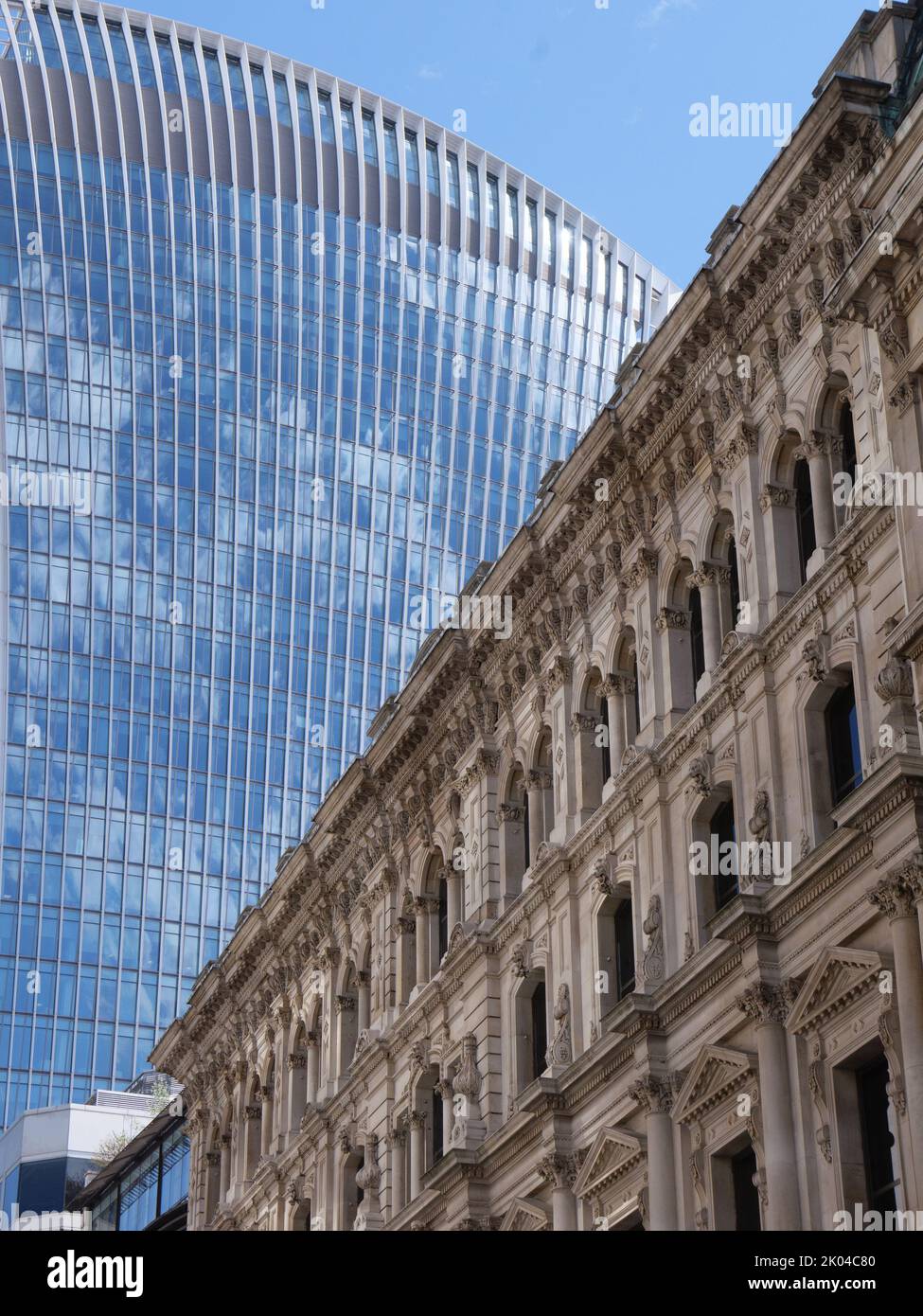 A high-angle view of a classic victorian building in a contrast with a ...