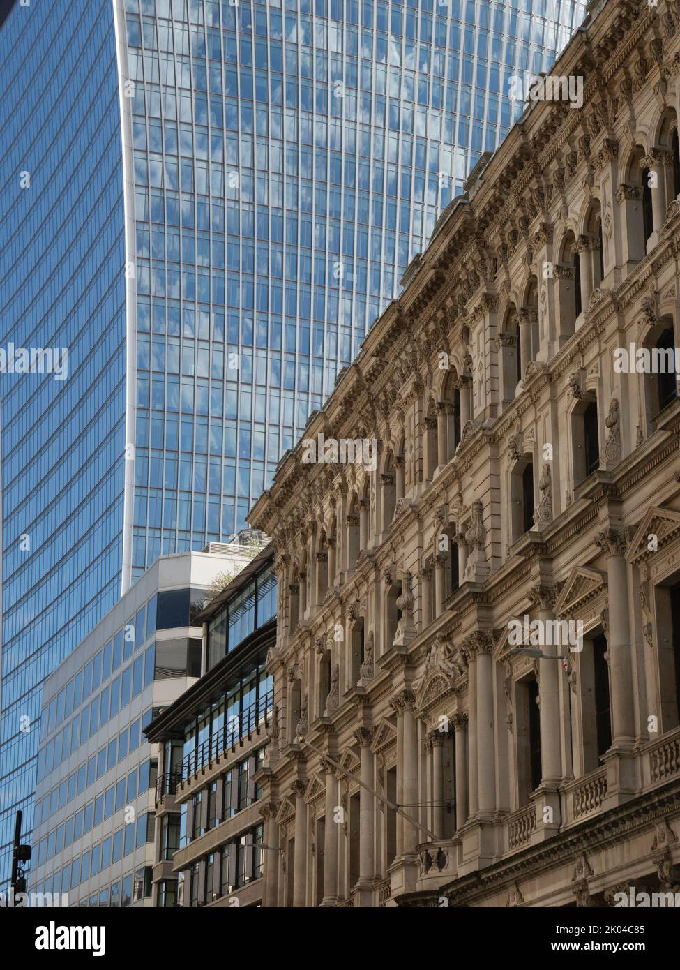 A high-angle view of a classic victorian building in a contrast with a ...