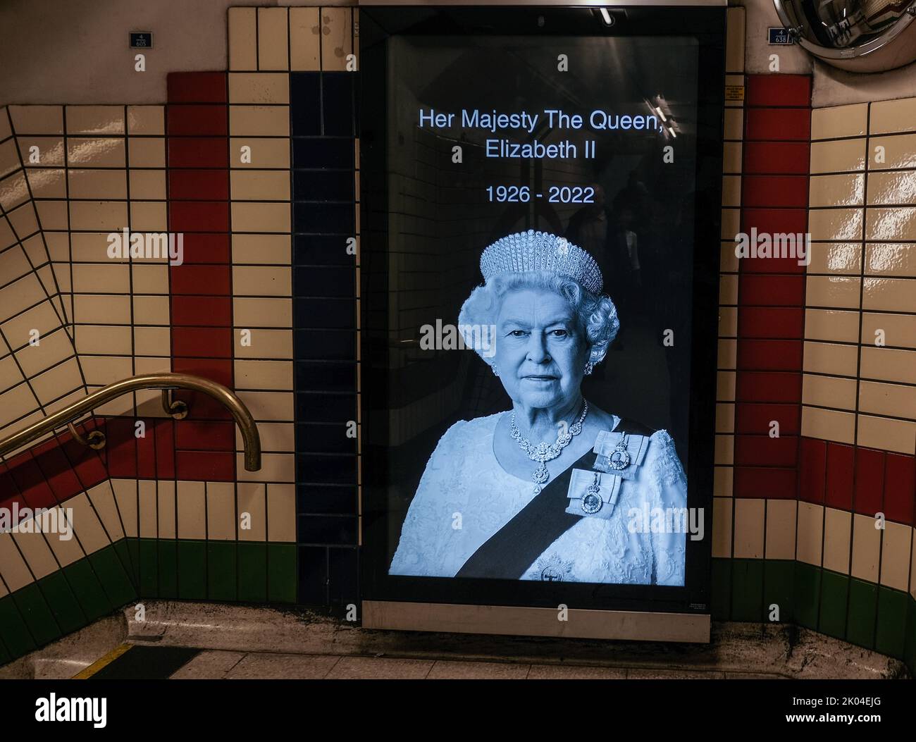 An image of Queen Elizabeth II is displayed on an electronic adverting ...